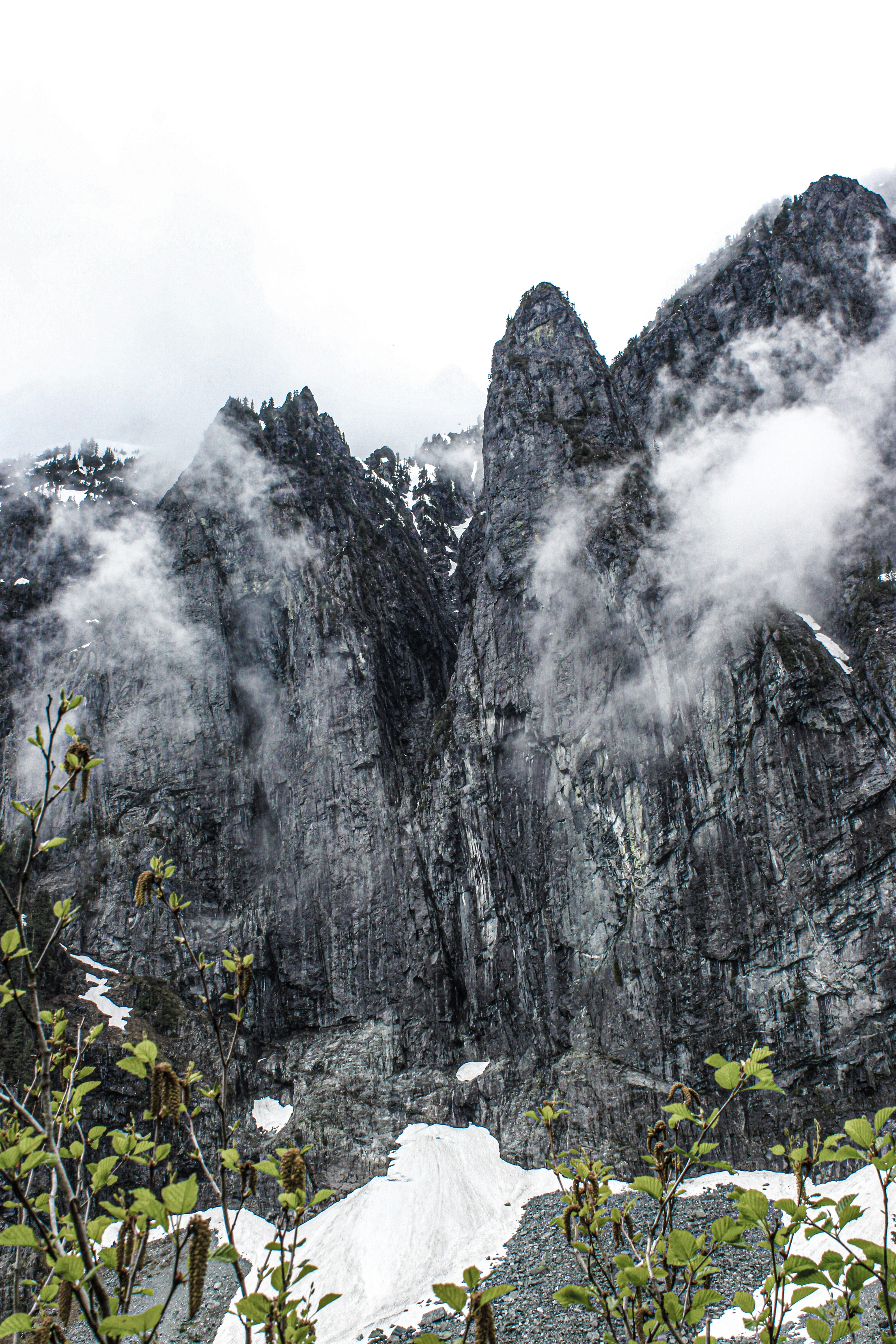 Spires Enshrouded by Mist: Snow-Lace on the Crags
