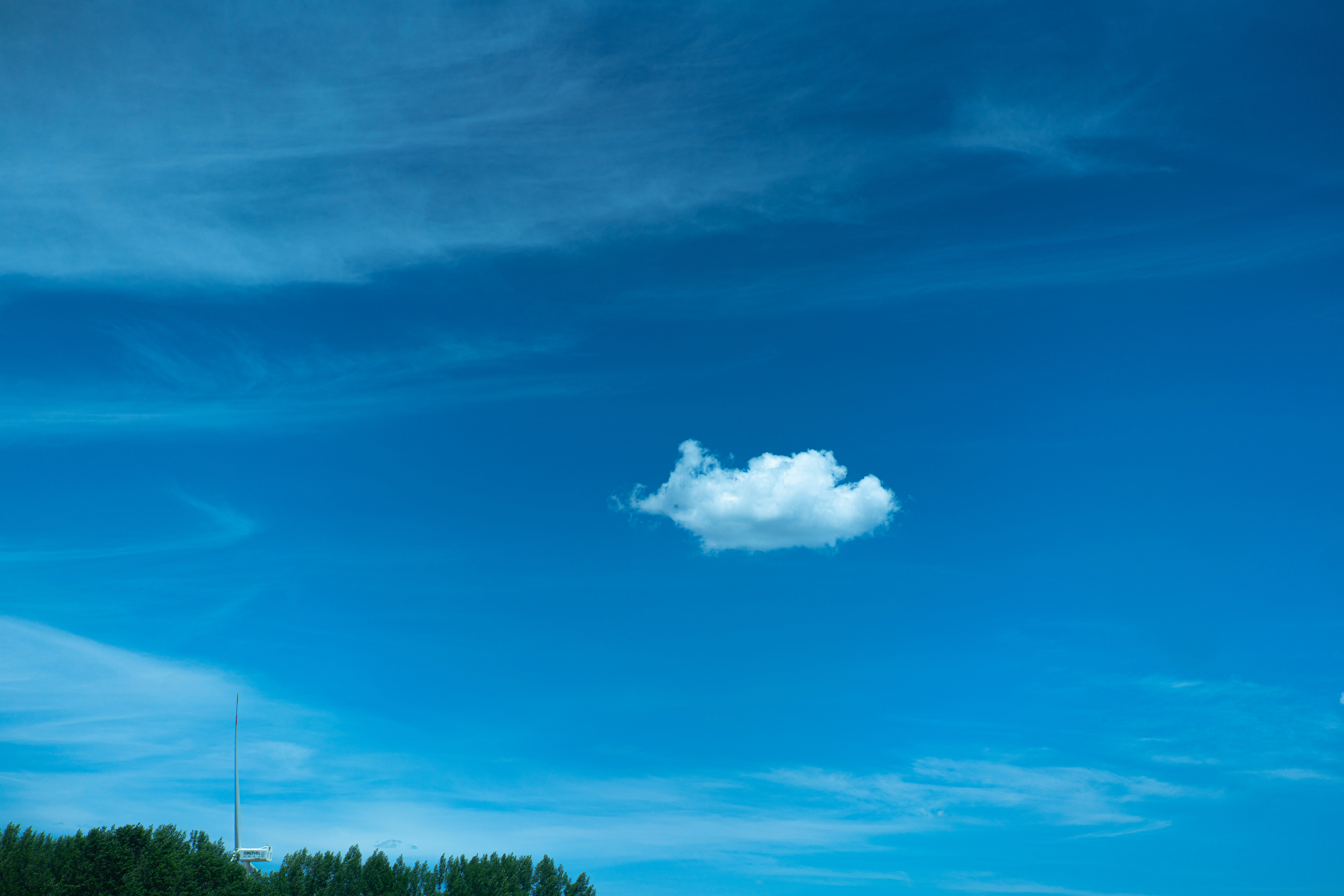A lone cloud is in the blue sky photo – Free Blue Image on Unsplash