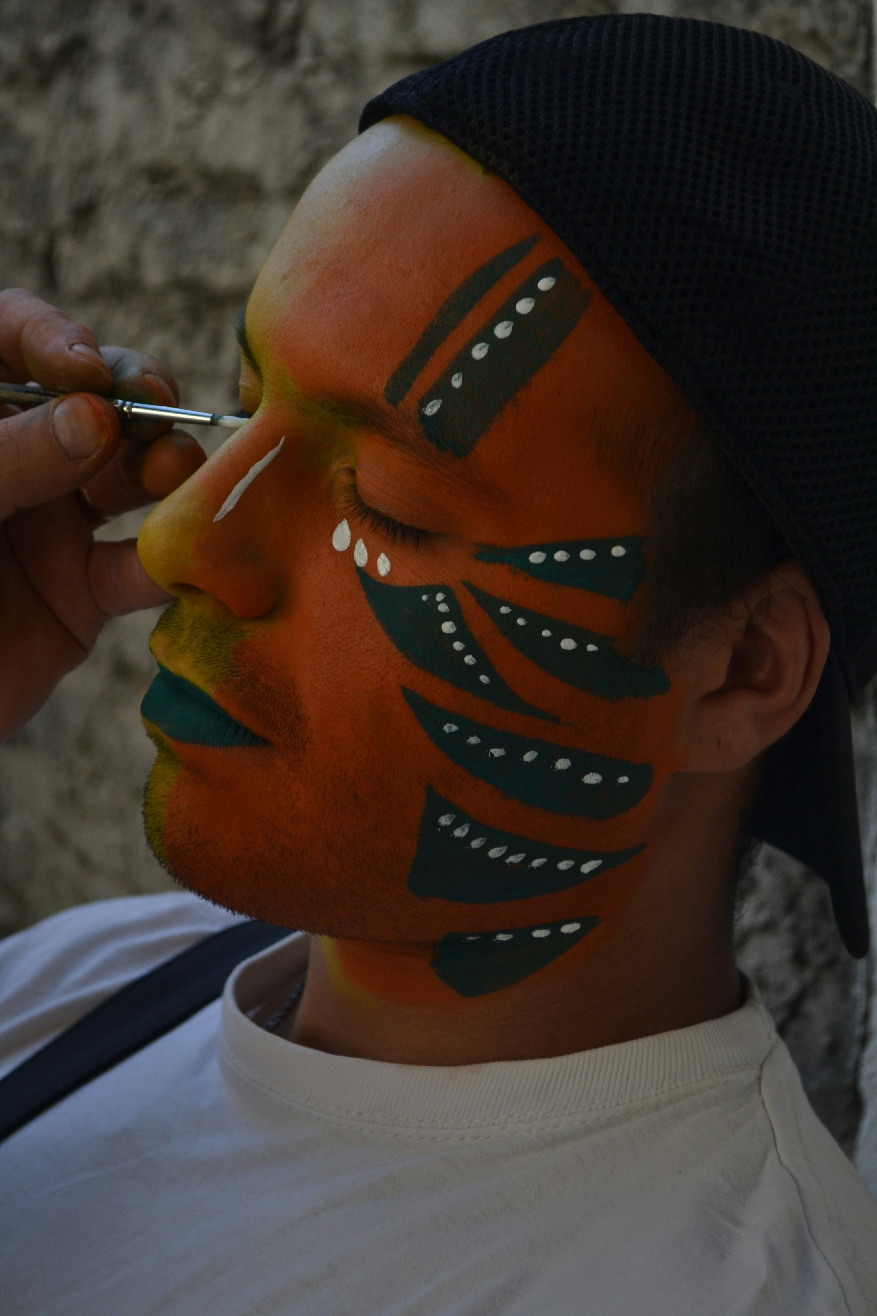 Fiery Dotwork Portrait: Orange Mask with White Accents