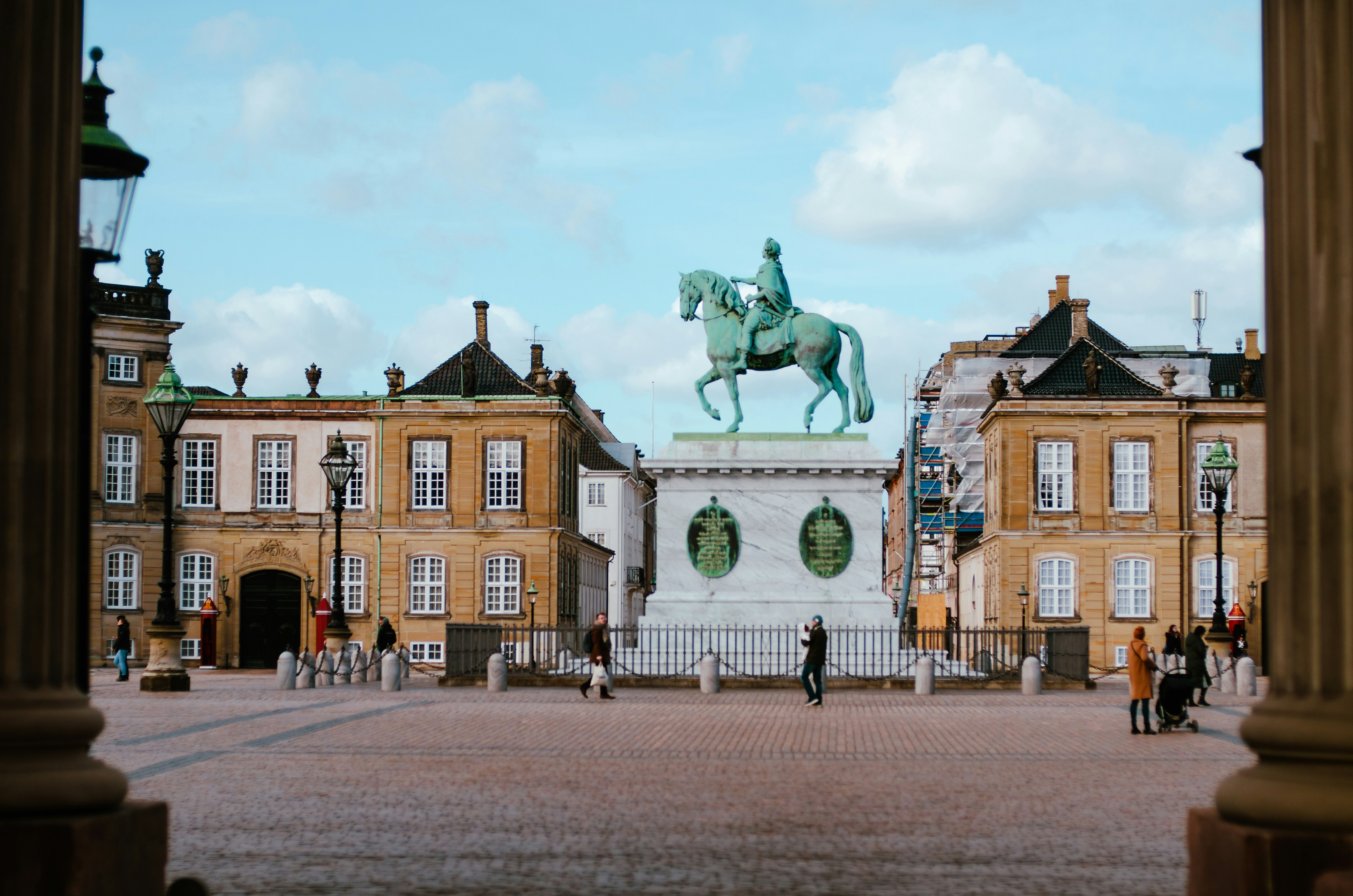 Bronze Rider in a Quiet European Square, Framed by Neoclassical Facades