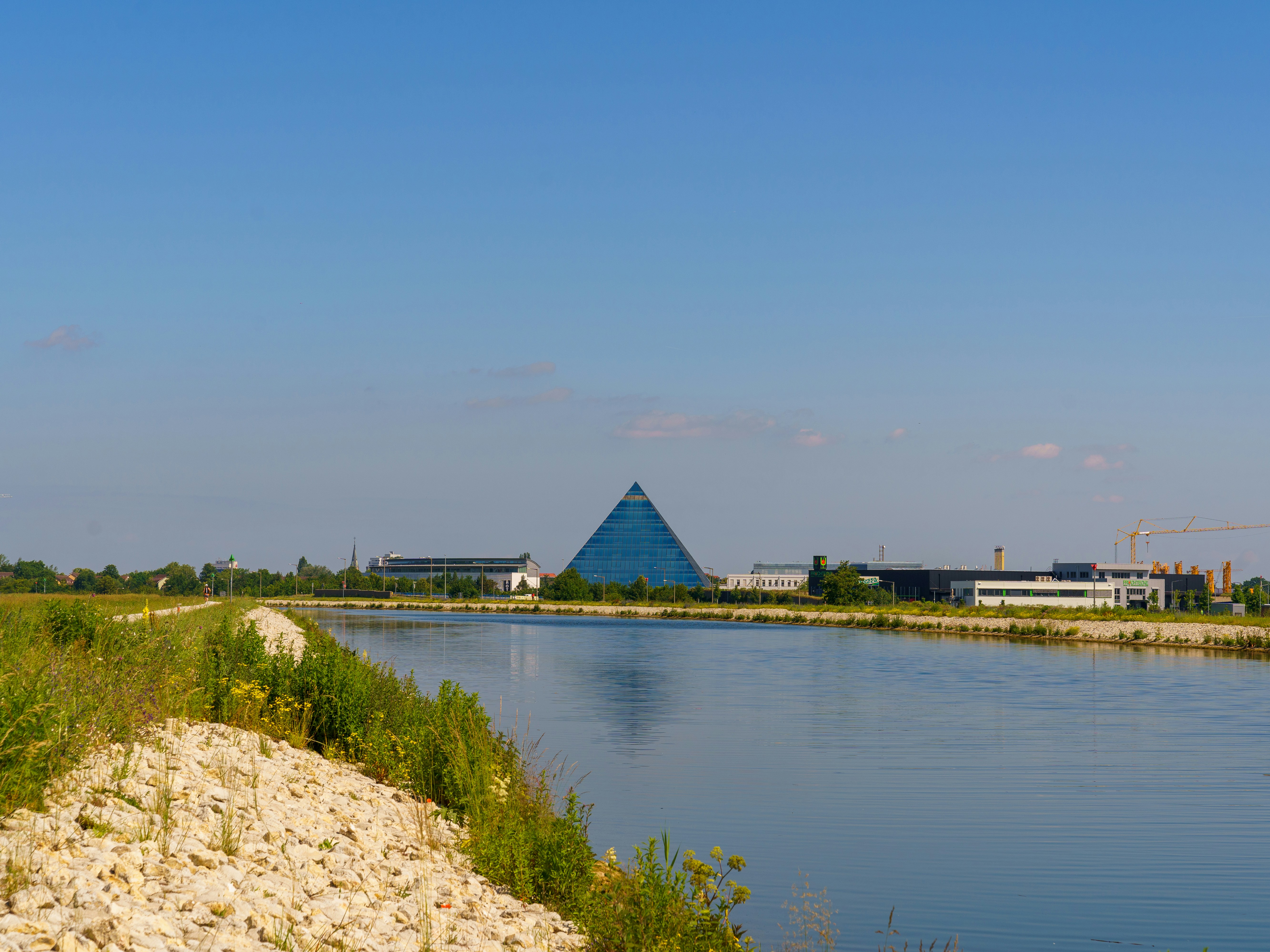 Riverside Glass Pyramid: Modern Geometry Over a Quiet Waterfront