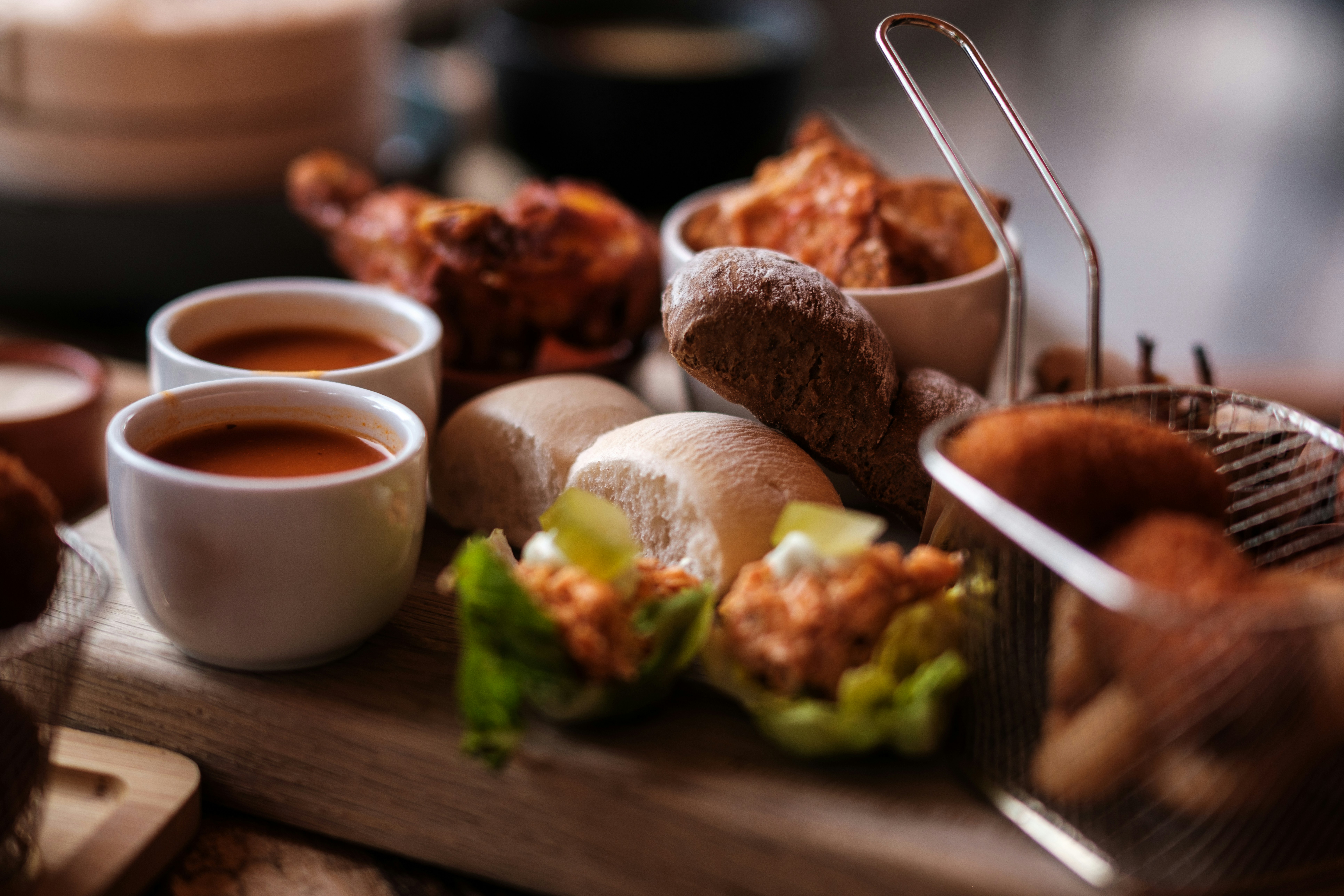 A wooden tray topped with different types of food photo – Free Brunch ...