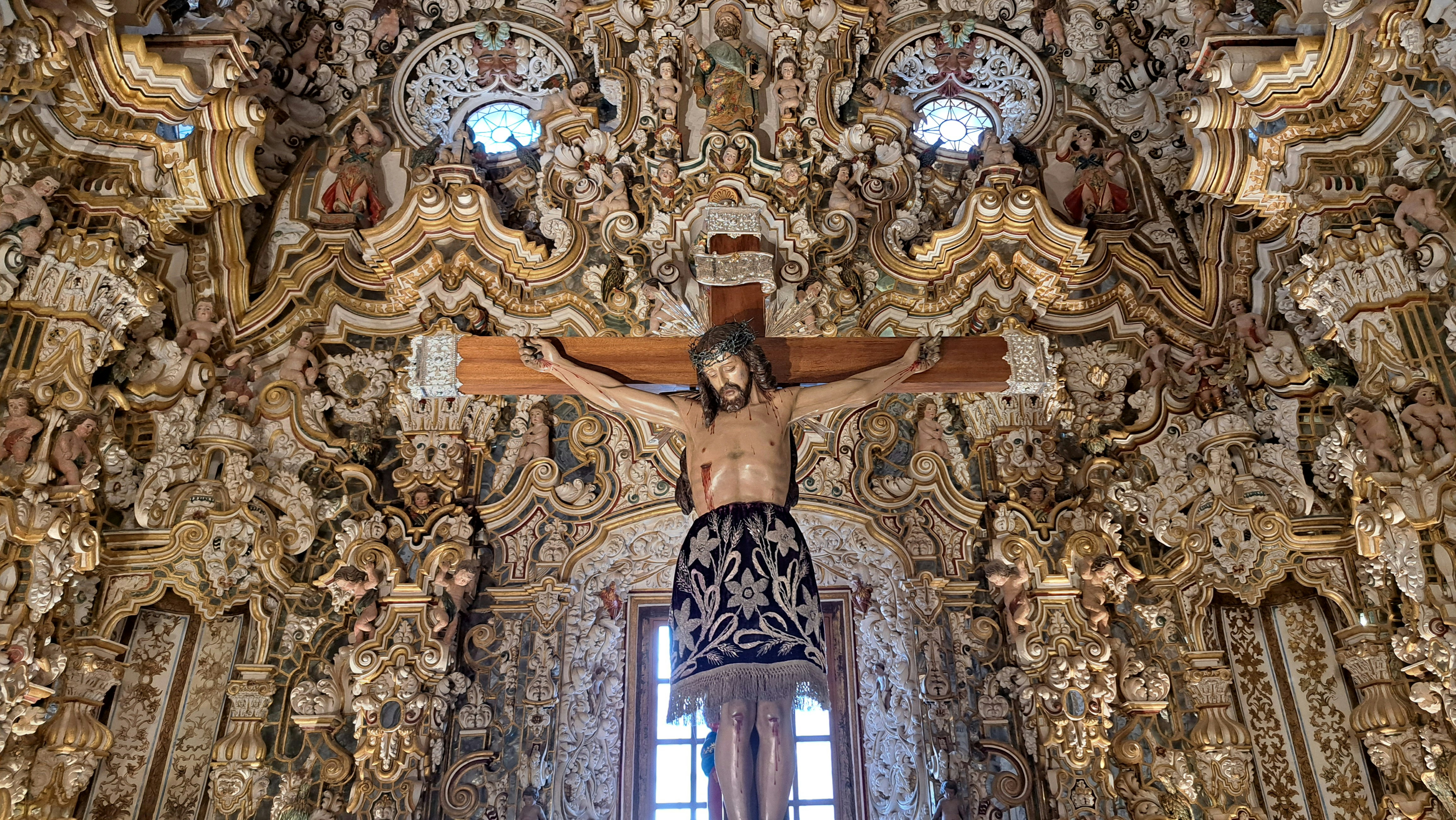 Centerpiece Crucifix Framed by Gilded Baroque Ornamentation