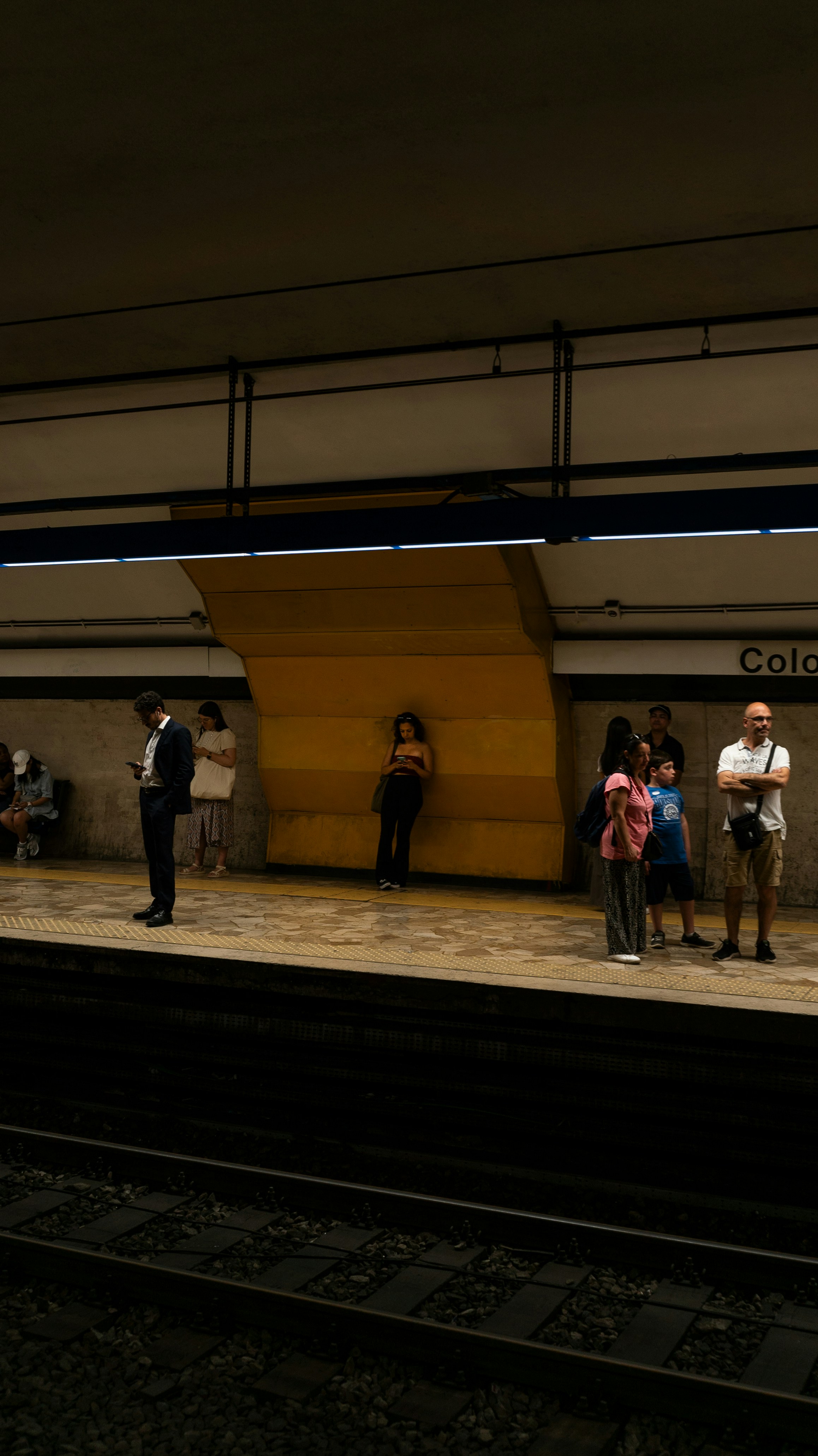 A group of people standing on a train platform photo – Free Rome Image ...