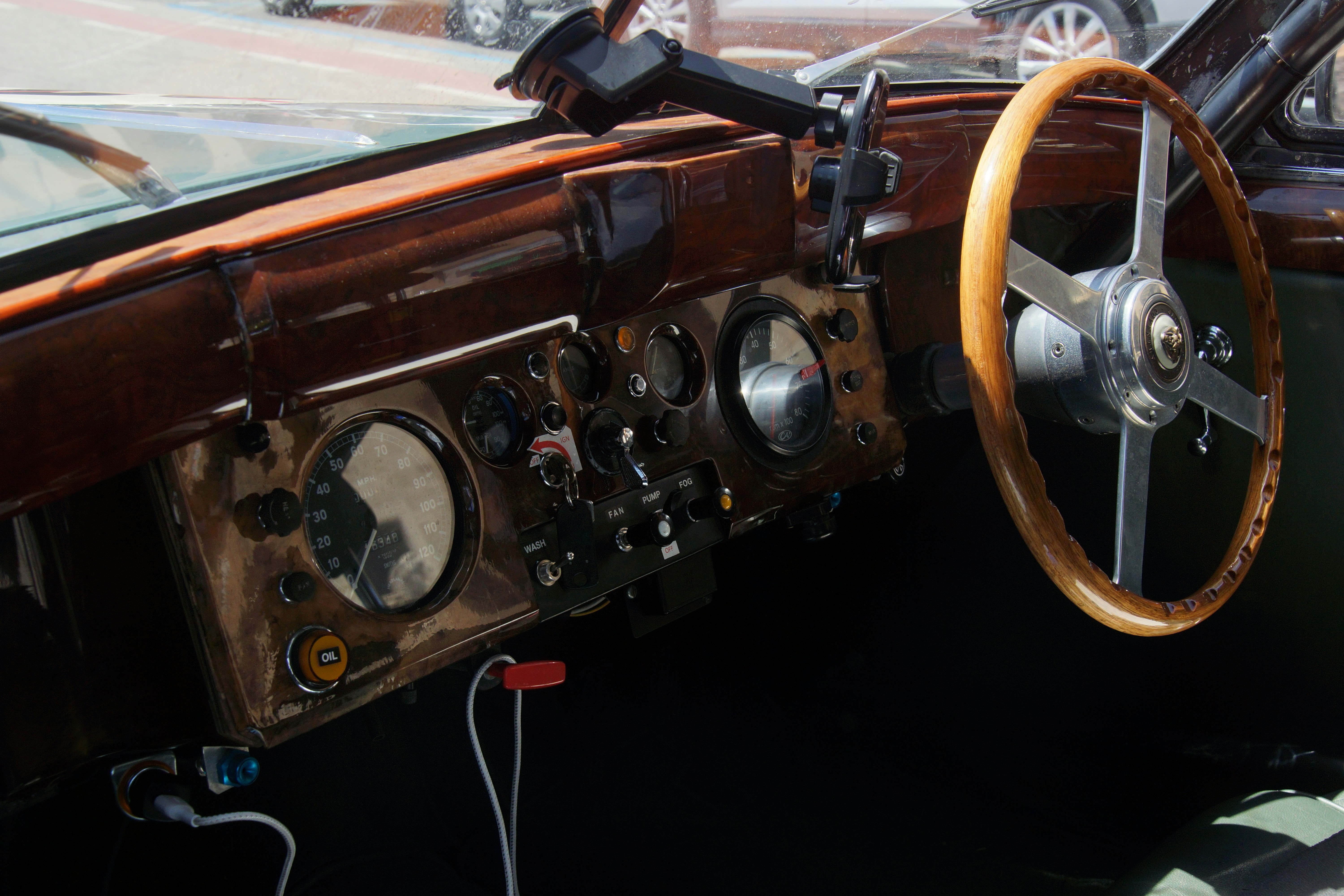 Burlwood Cockpit: Brass Gauges and a Wooden Wheel