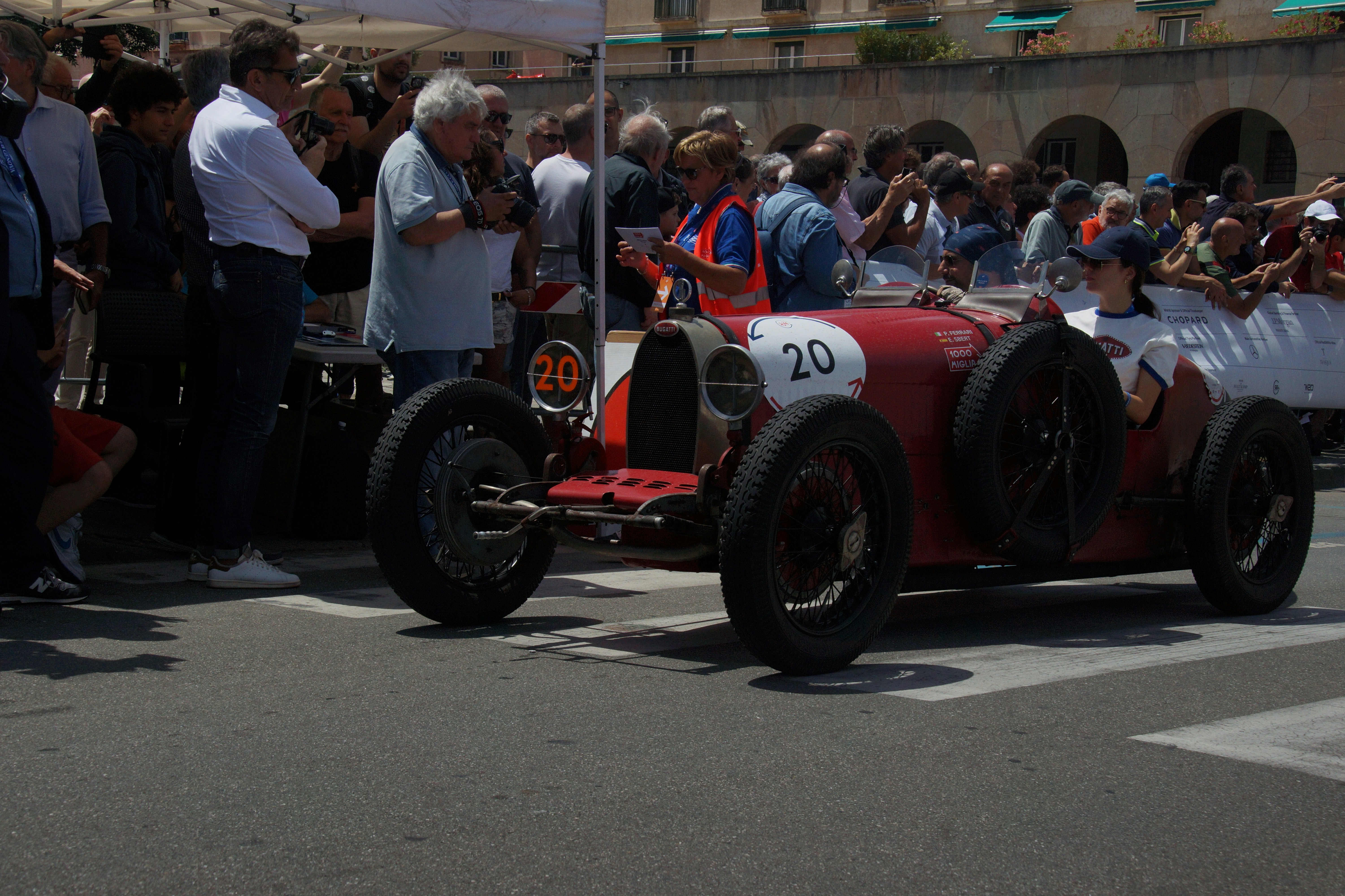 A red race car with a number on the front photo – Free Genova ...