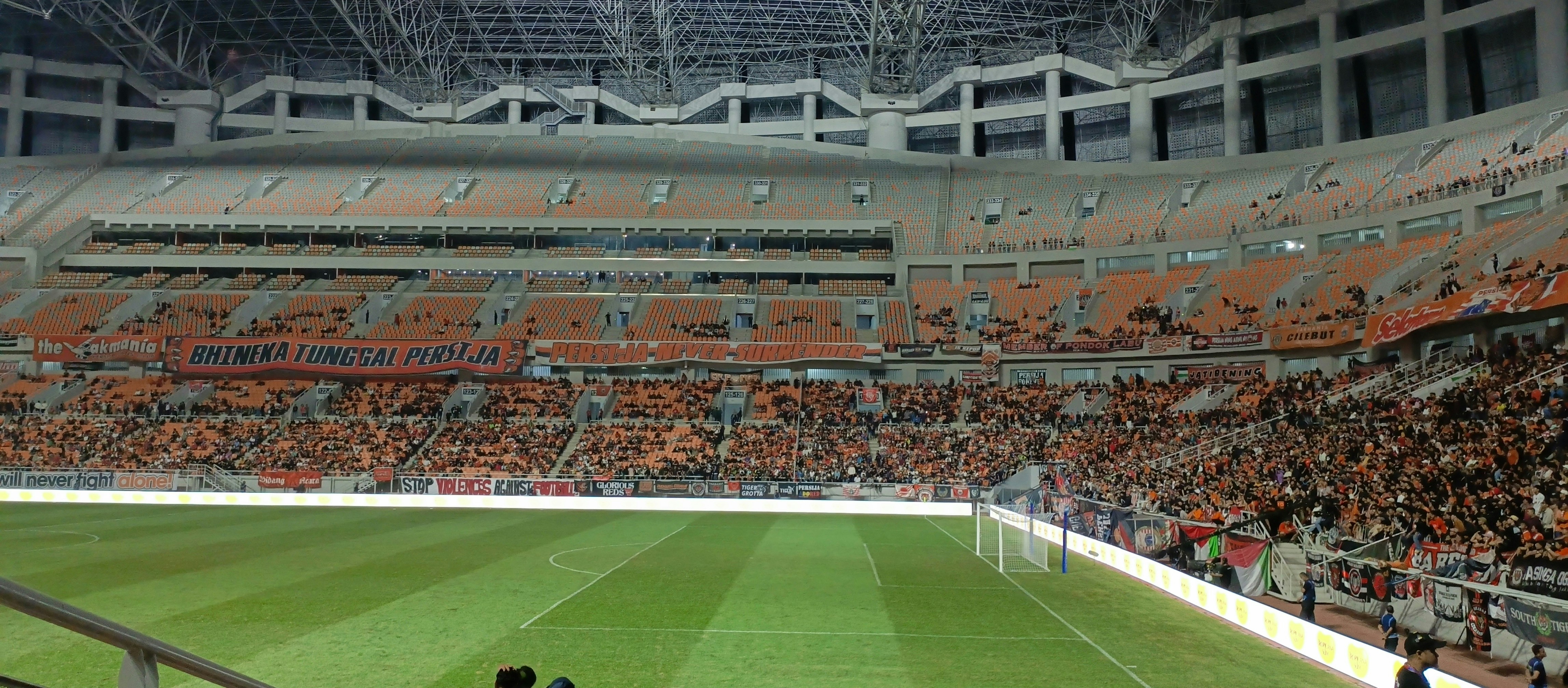 A stadium full of people watching a soccer game photo – Free Human ...