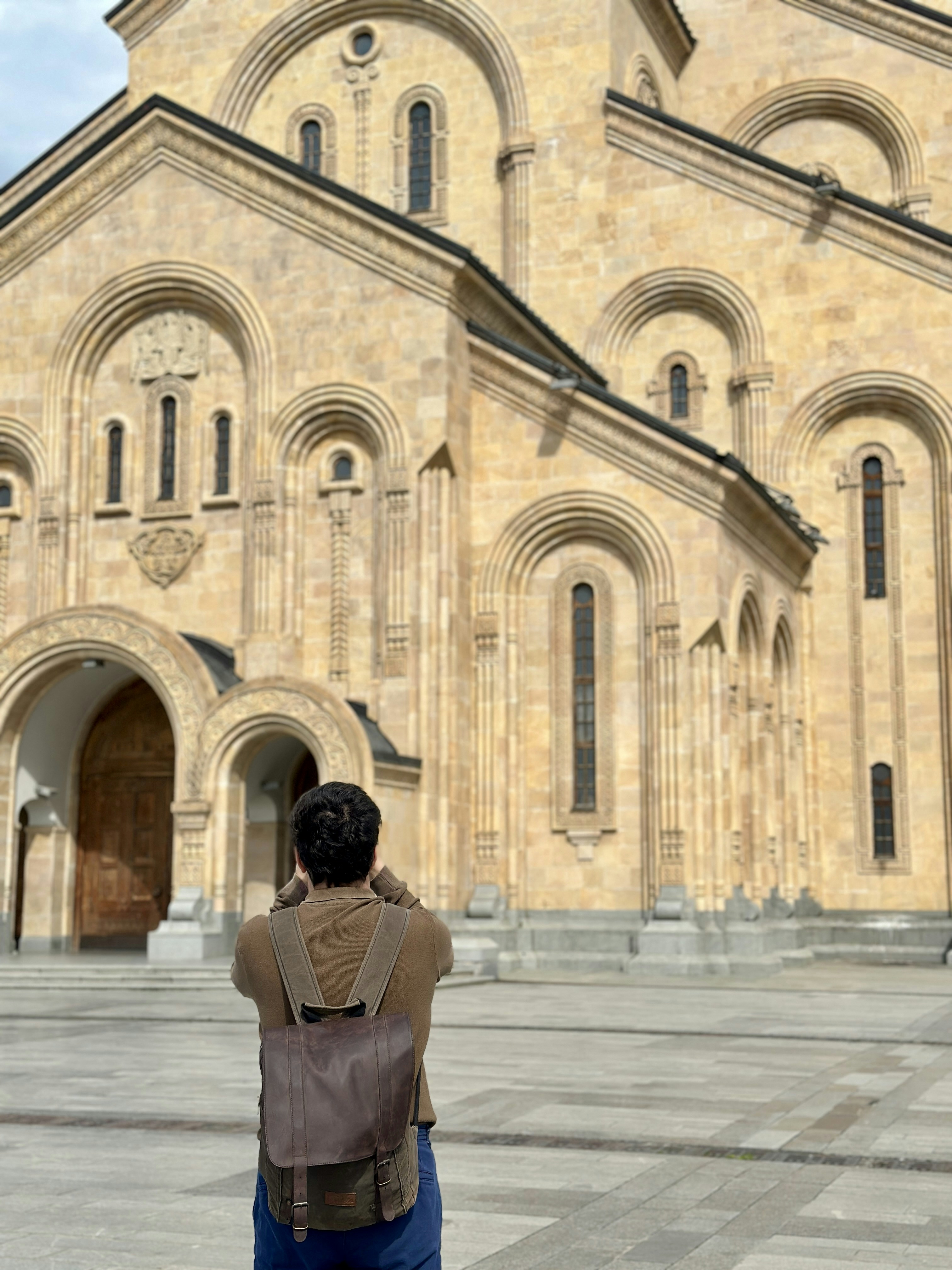 Backpacker at the Grand Romanesque Cathedral