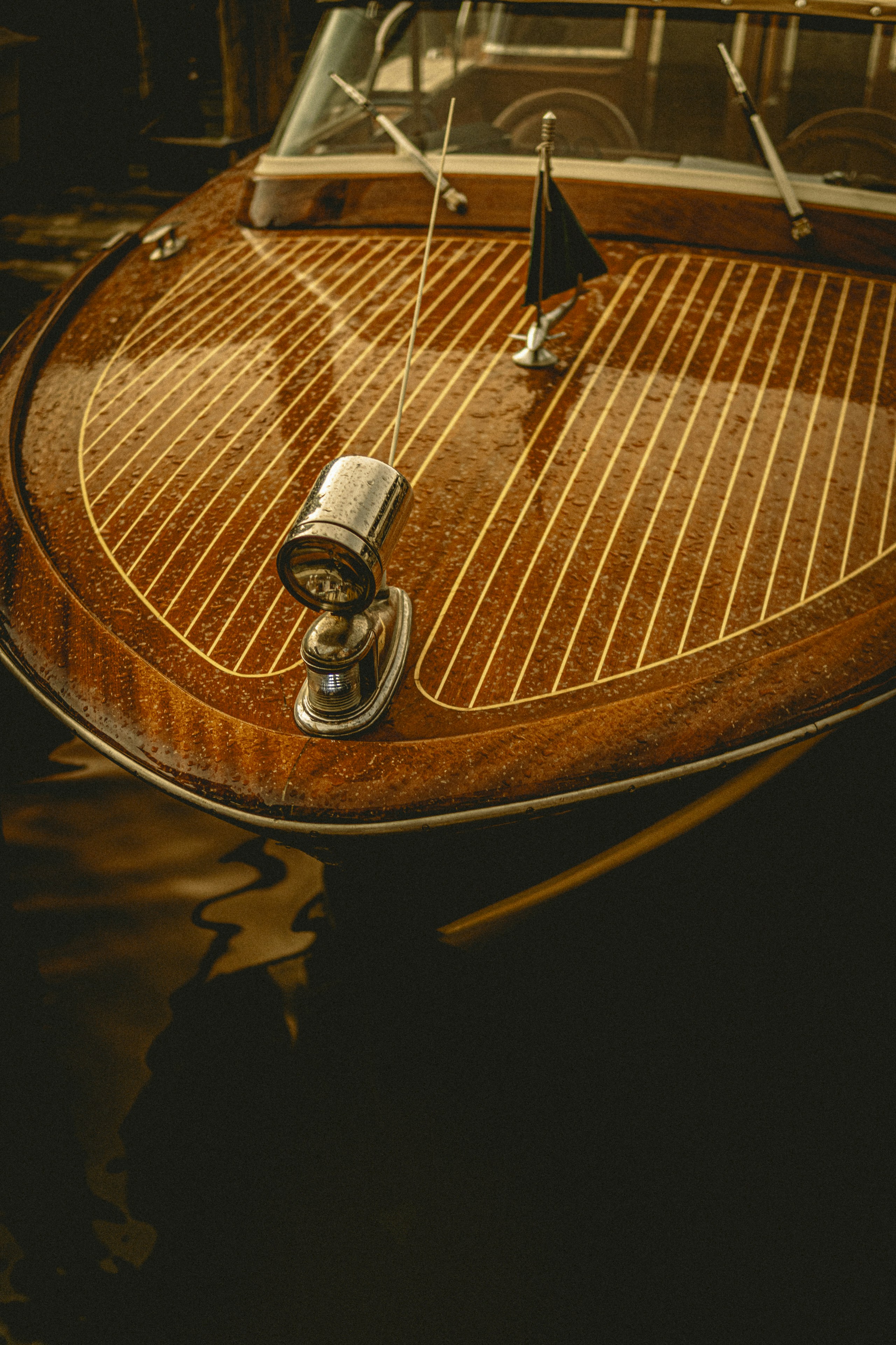 Brass Beacon on Teak: The Quiet Geometry of a Vintage Boat Deck