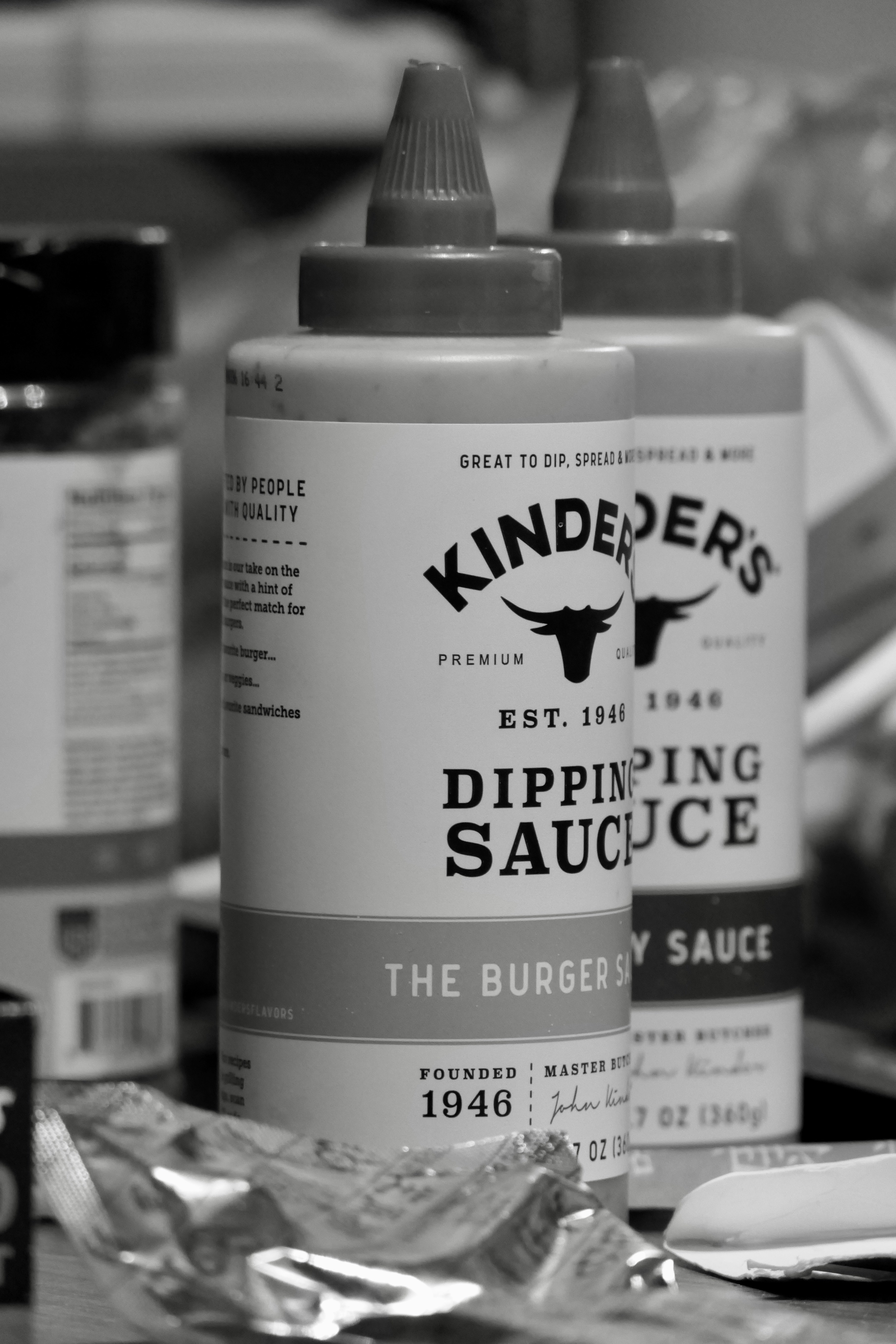 Monochrome Close-Up on Kinder's Dipping Sauce Bottles