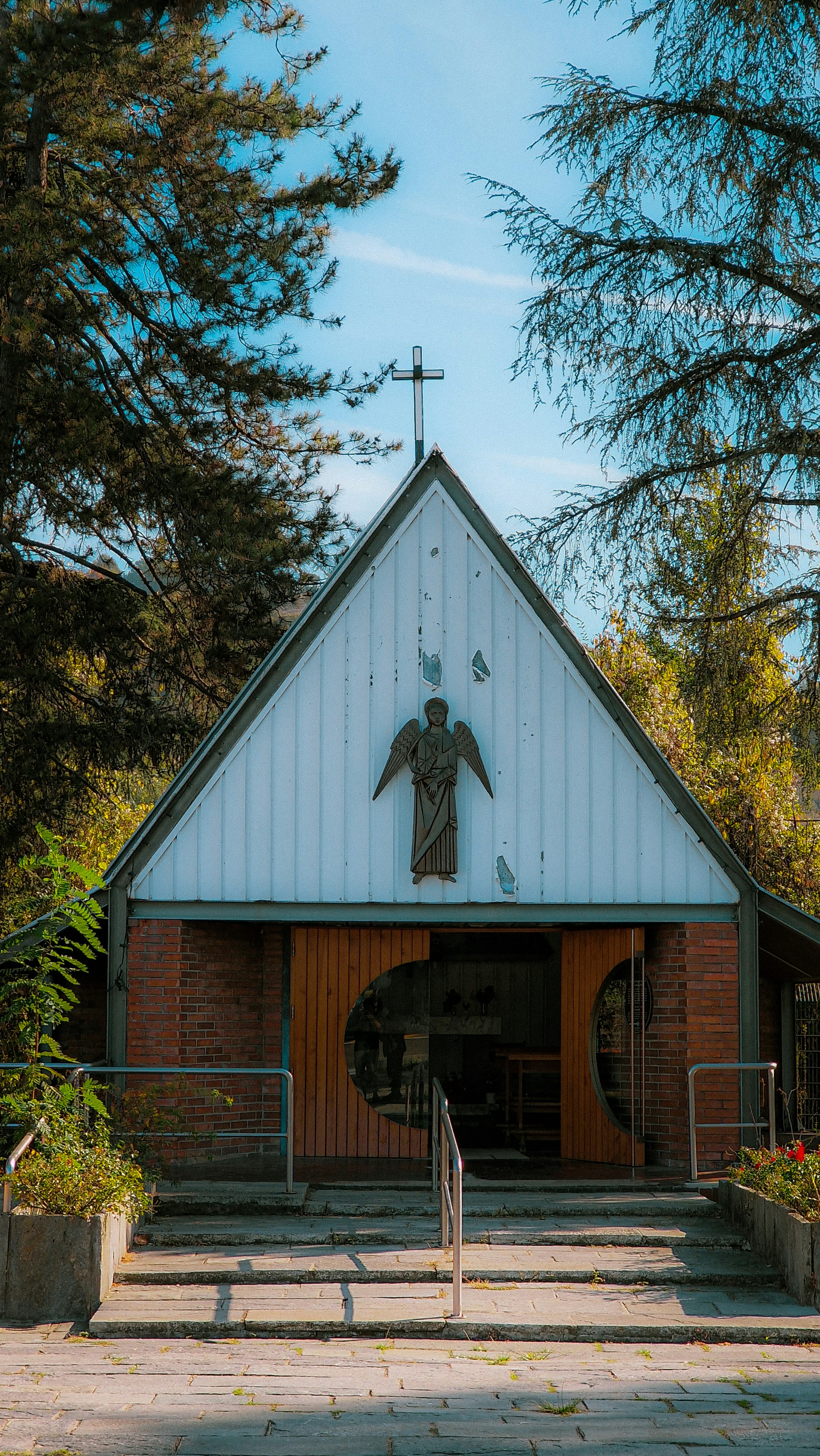 Gabled Chapel in the Pines: An Angel Keeps Watch