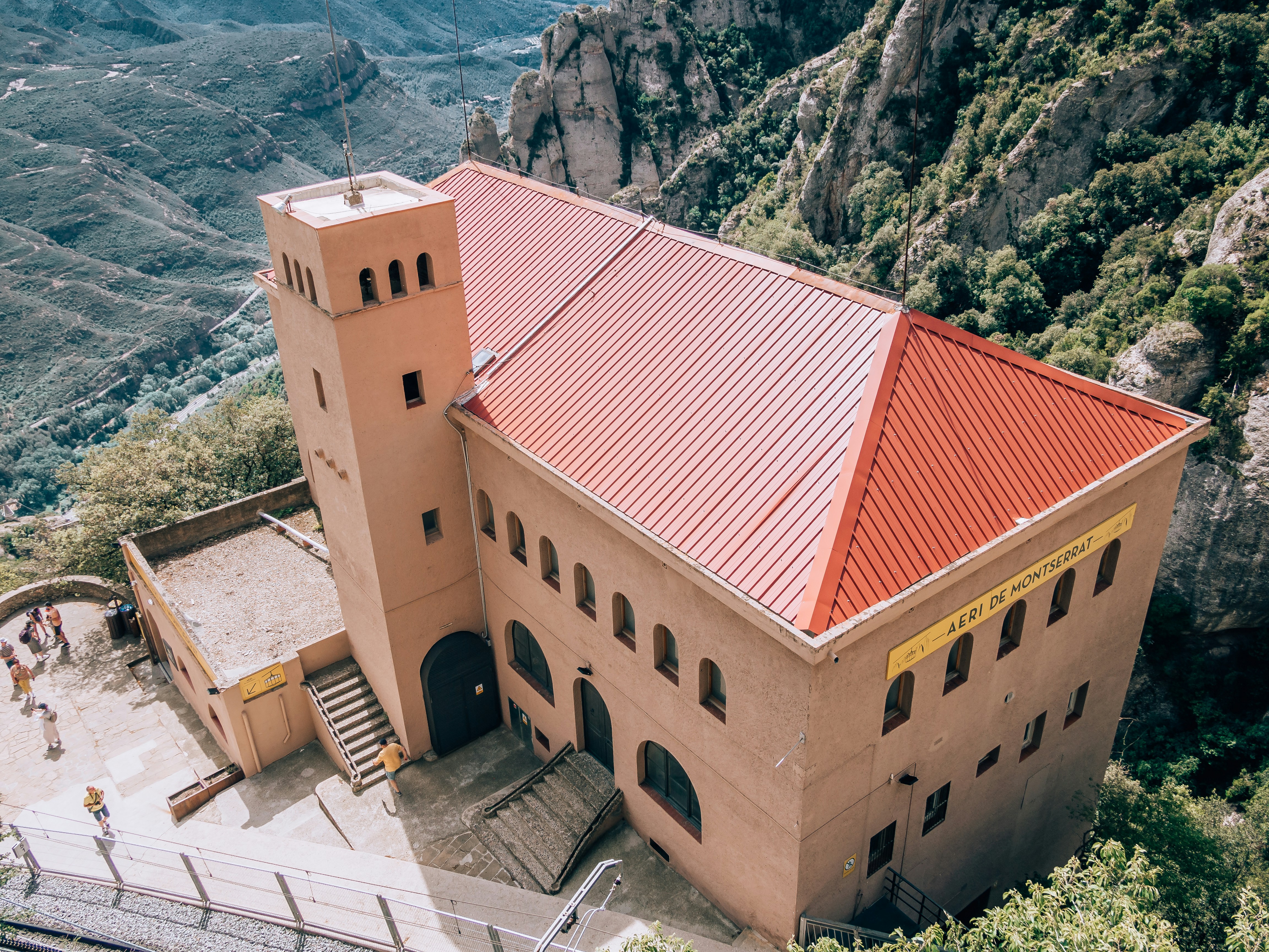 Cliffside Monastery with a Terracotta Roof Over a Wind-Scoured Canyon
