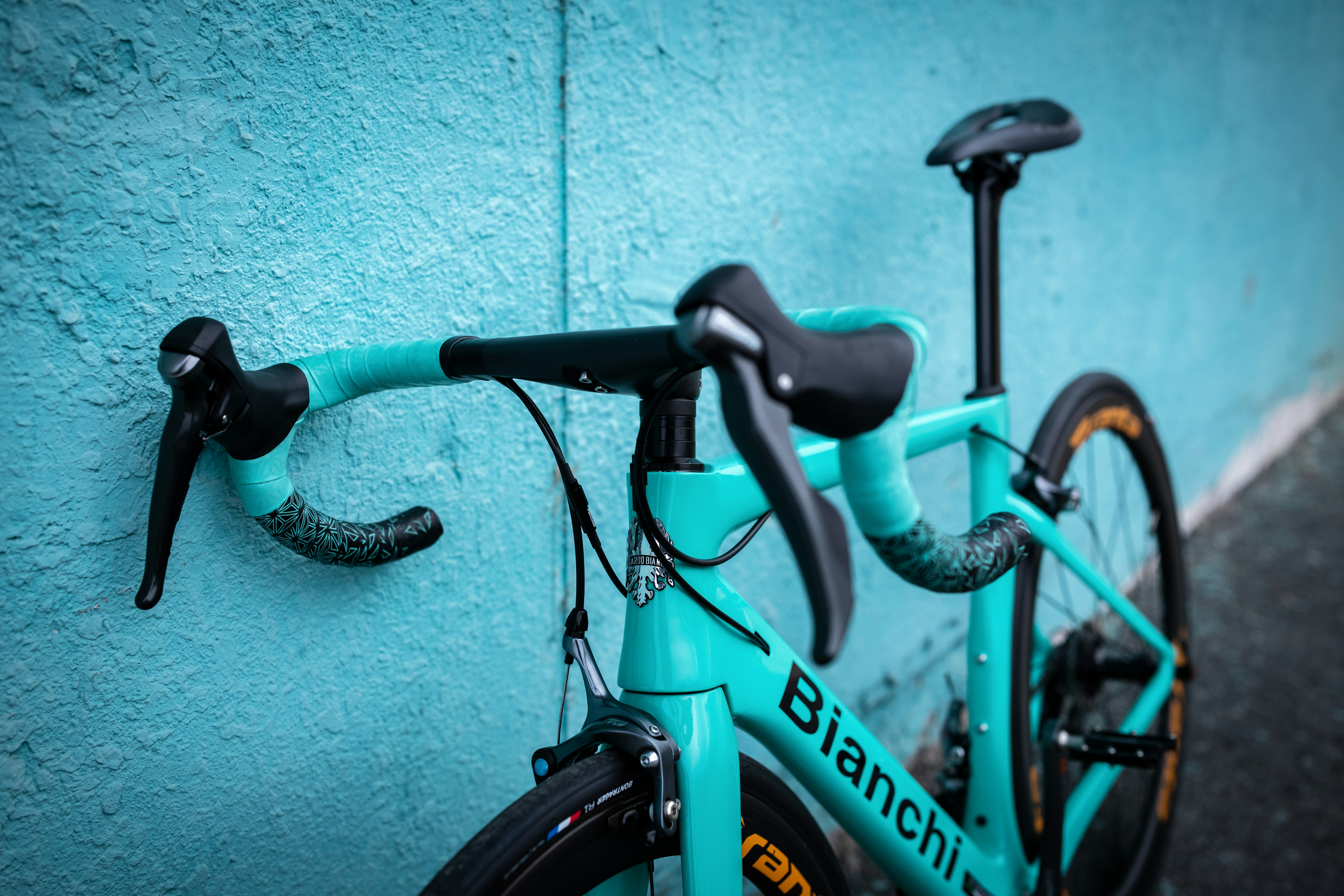 A close up of a blue bike against a blue wall photo – Free Roadbike ...