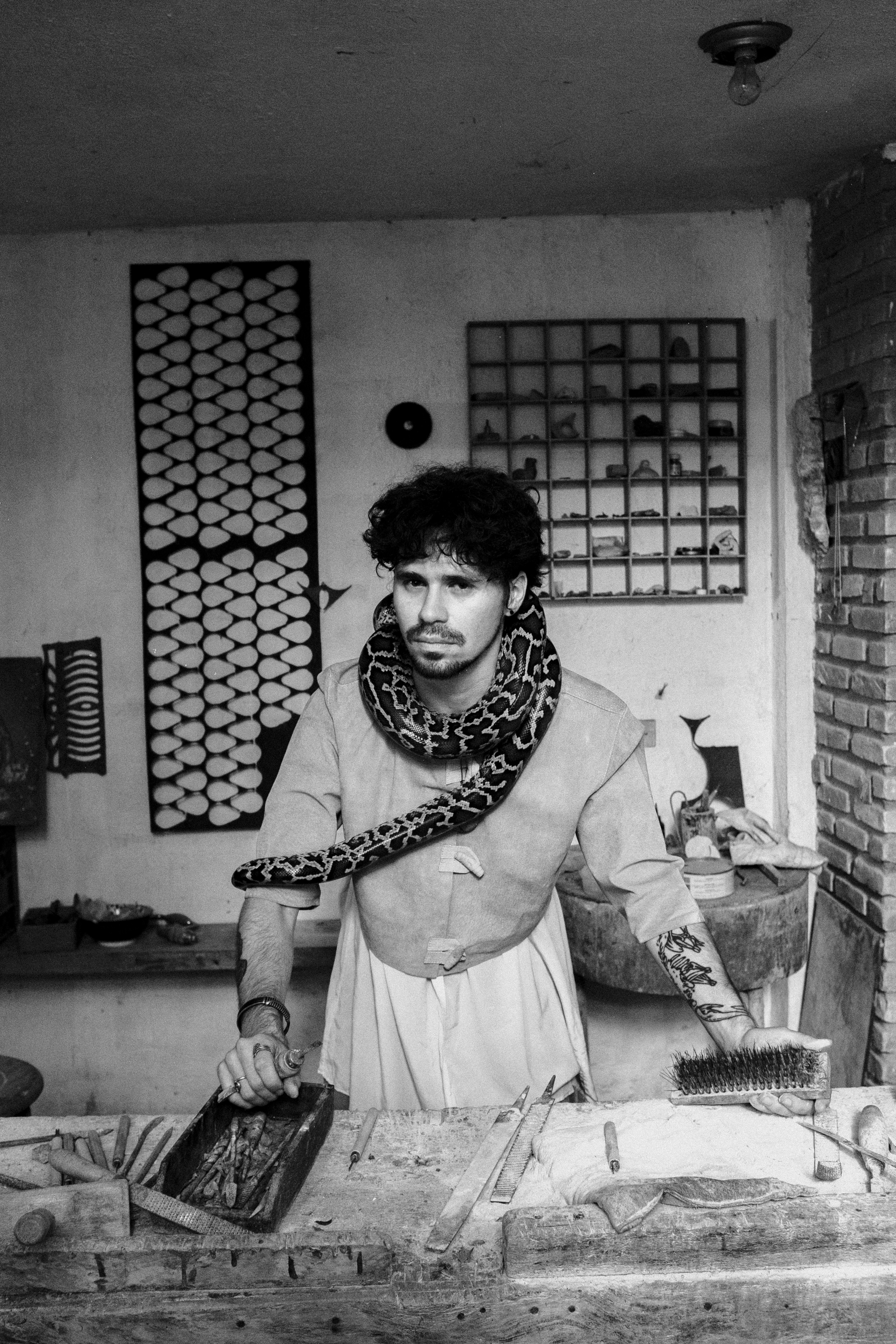 Charcoal Portrait in a Workshop: A Craftsman's Quiet Poise