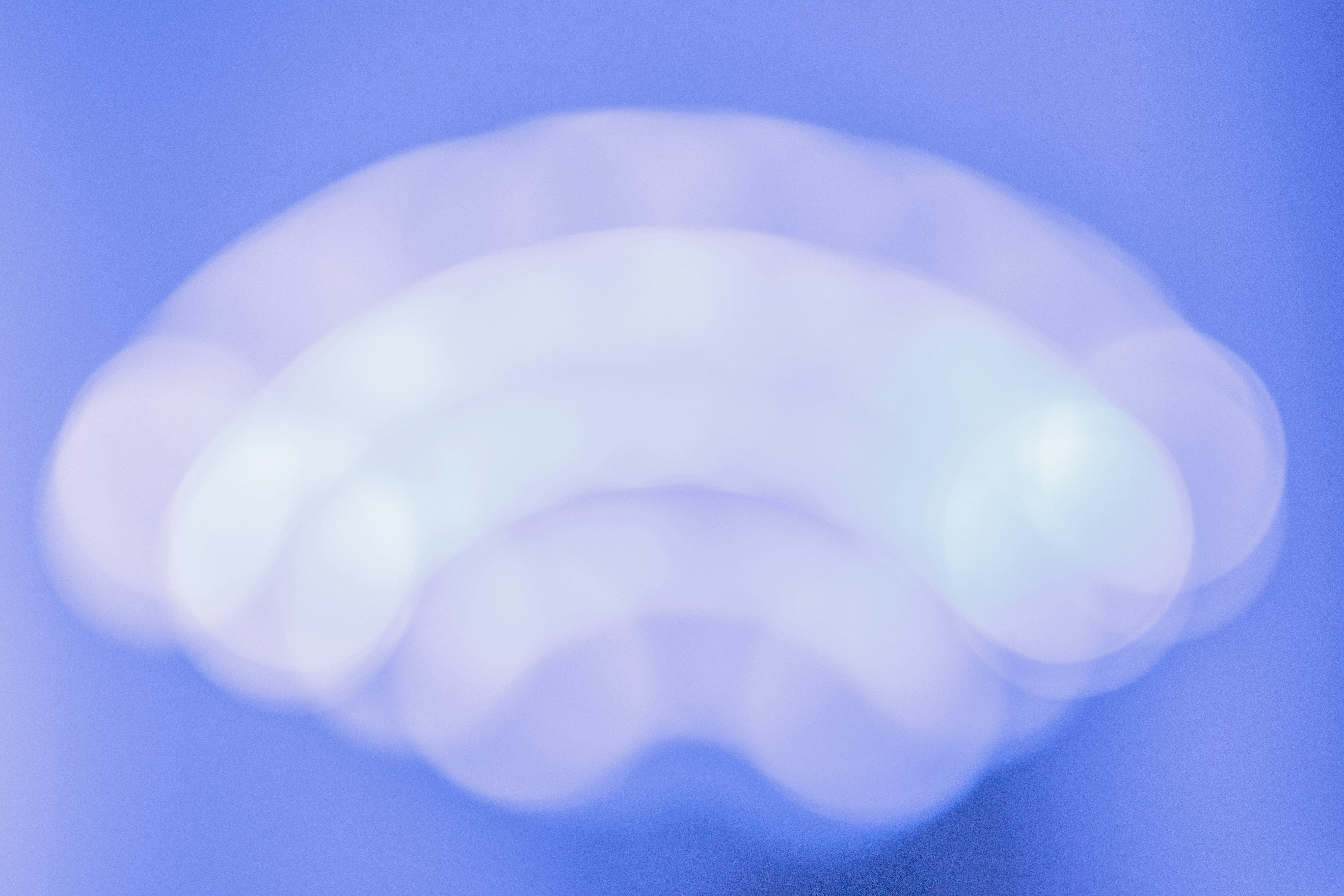 A blurry photo of a white object in the sky photo – Free Light Image on ...
