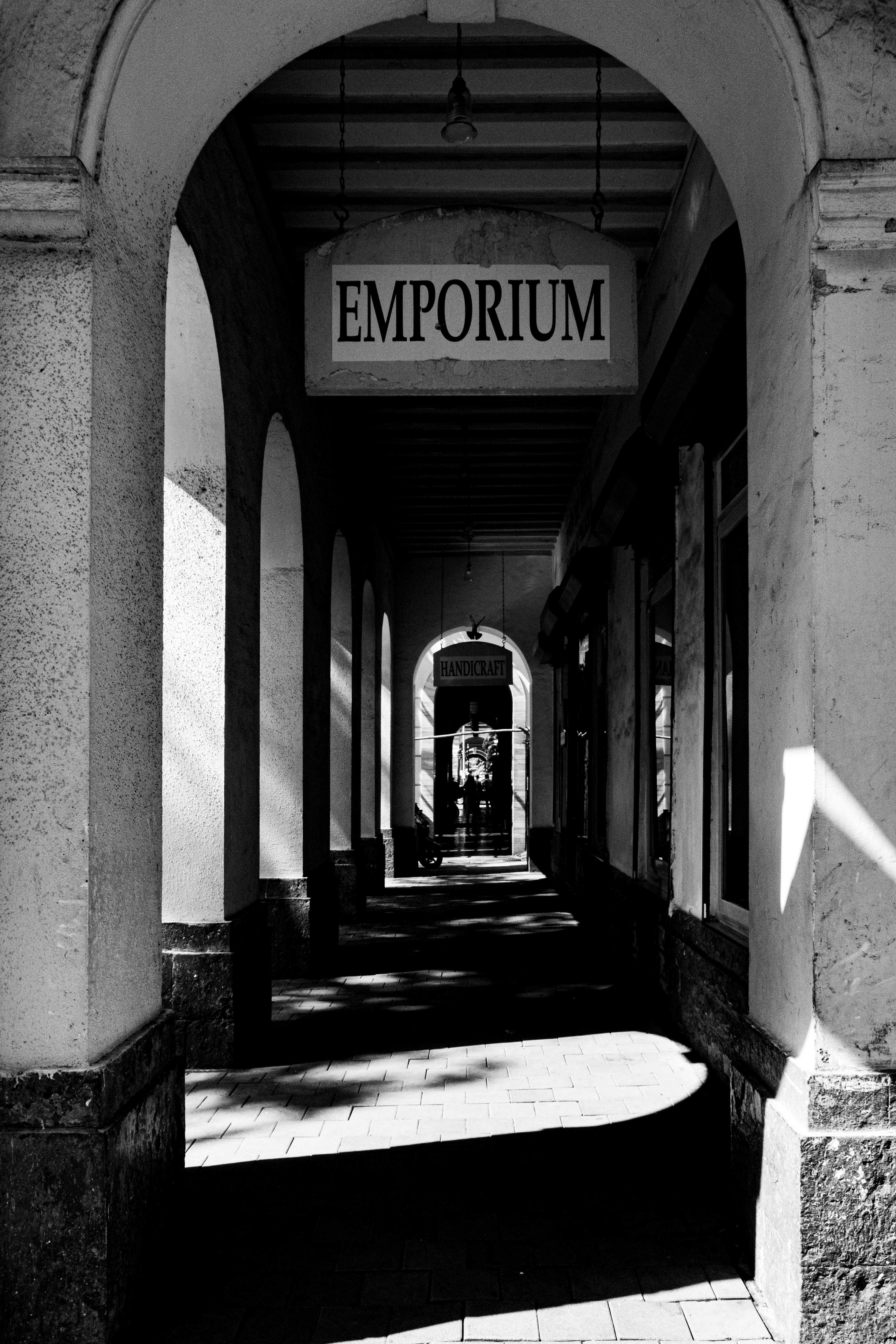 Echoes of the Archway: A Monochrome Corridor to the Emporium