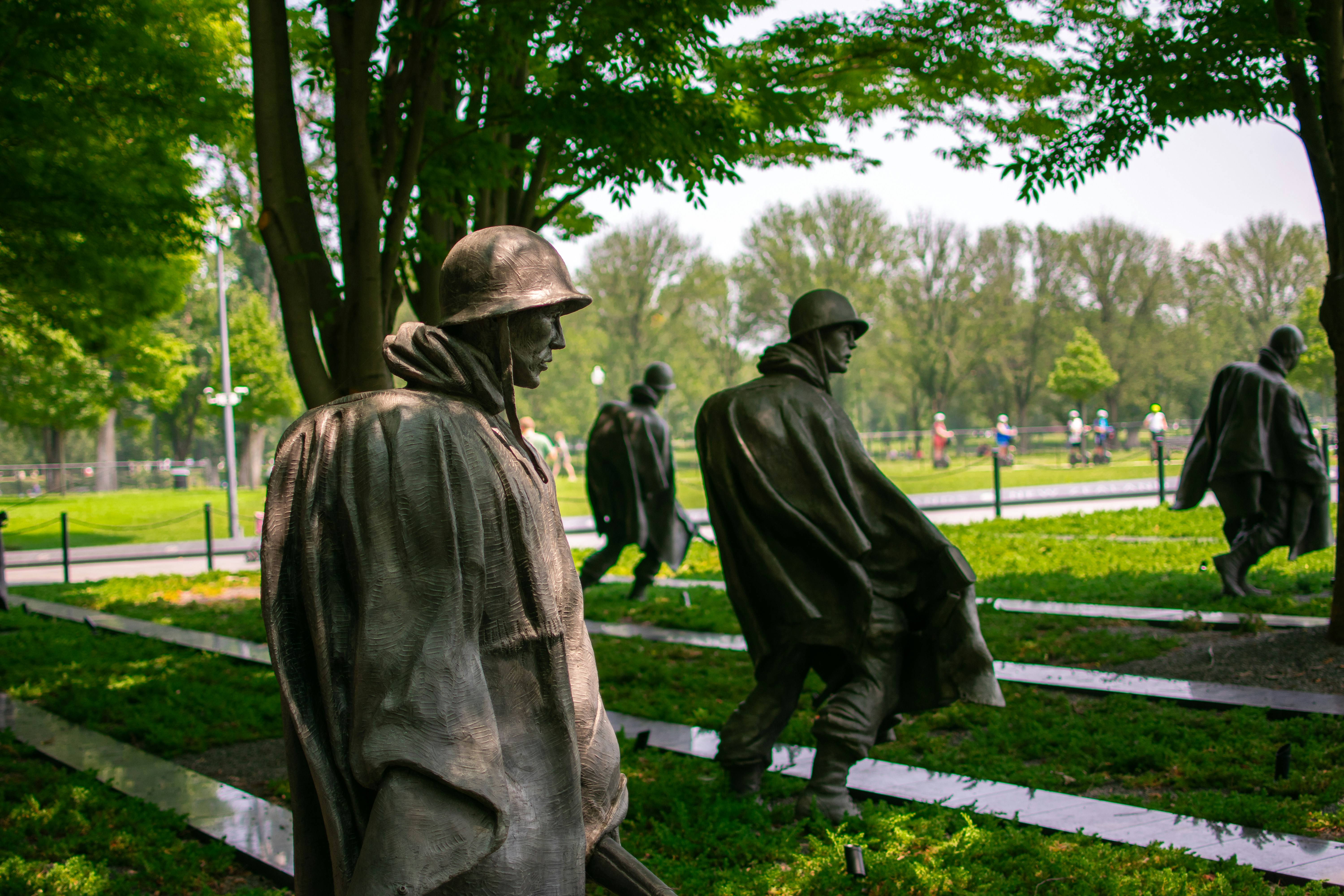 A group of statues of men in a park photo – Free Photography Image on ...