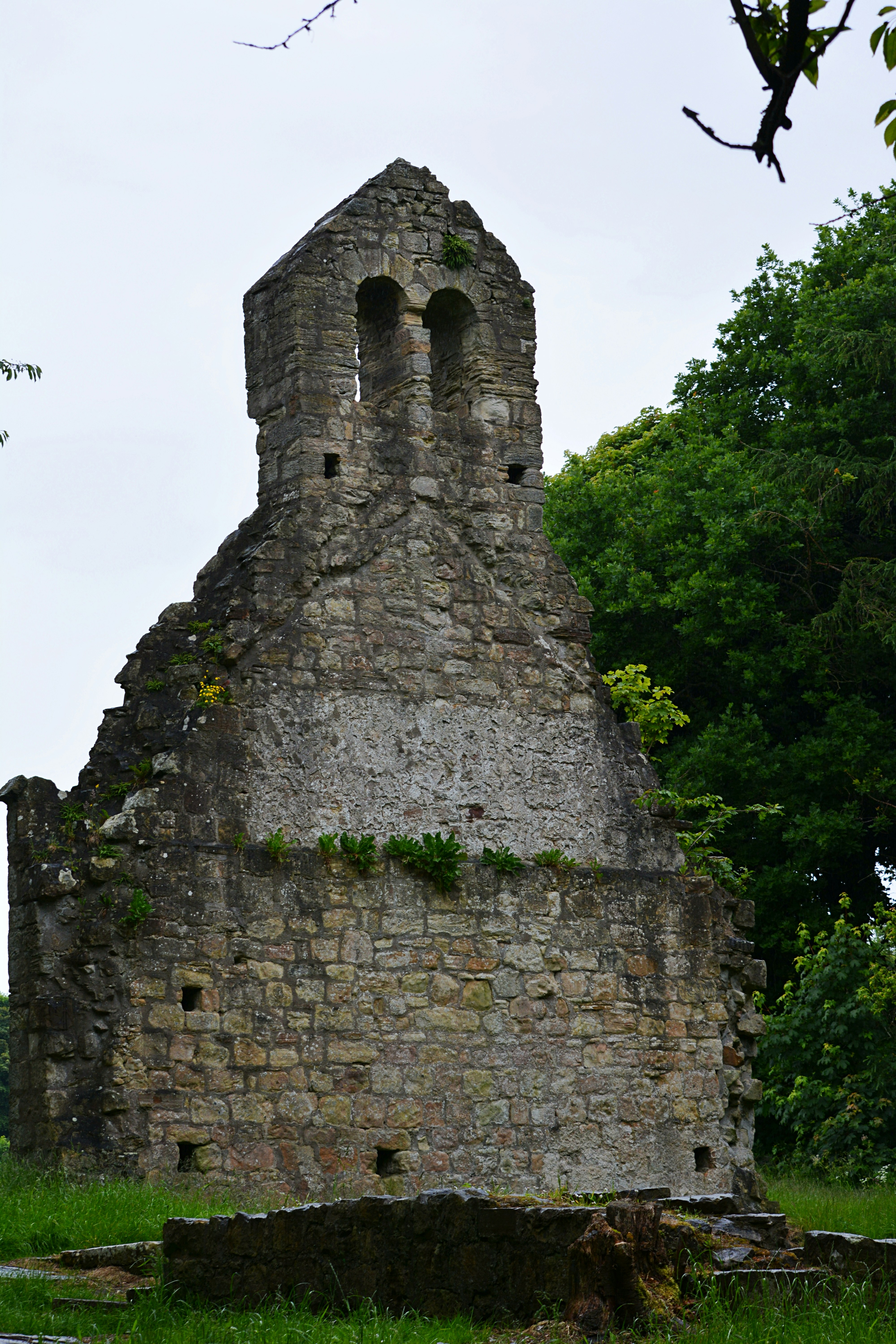 an old stone building with a clock tower