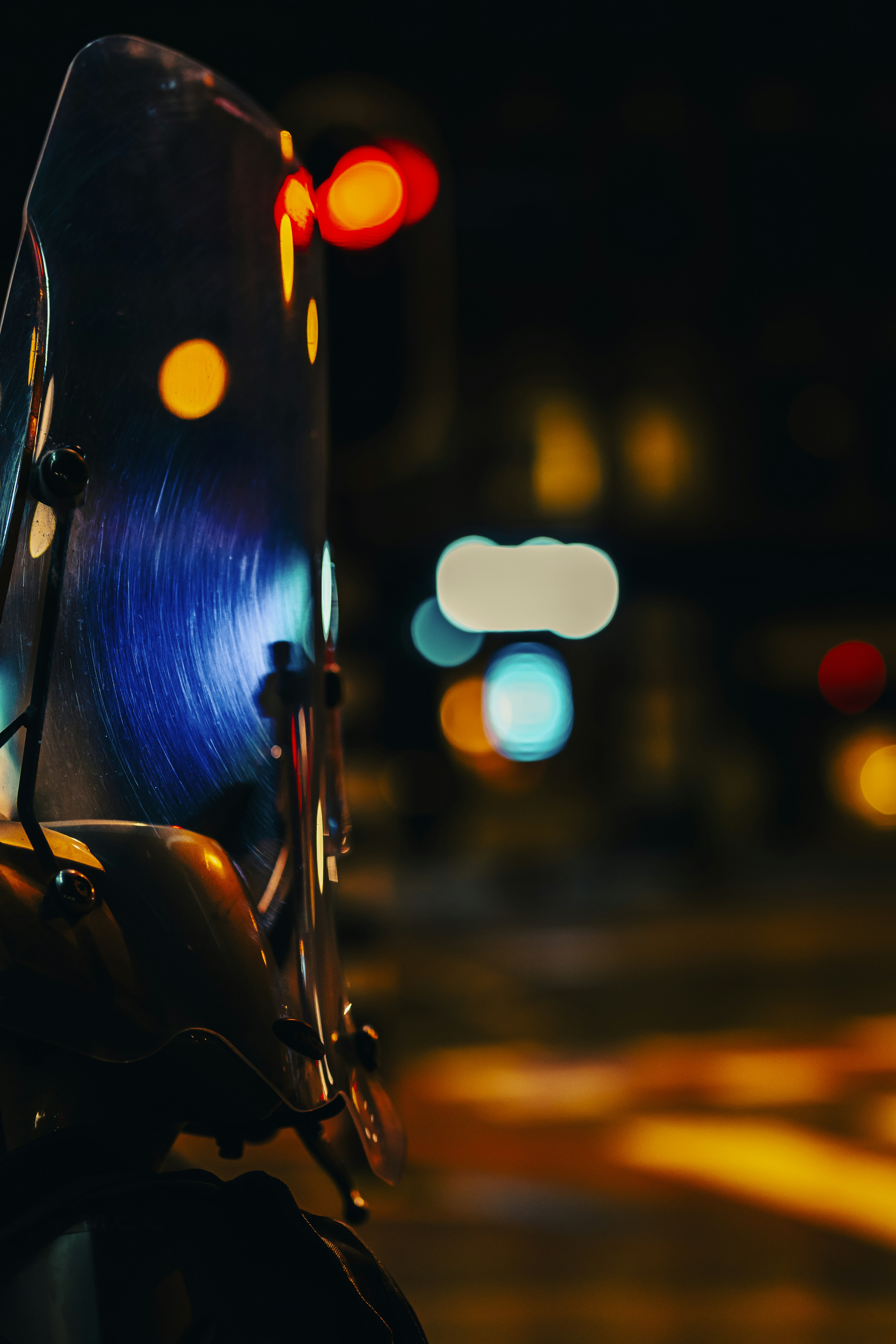 Blue Neon Echoes on a Night-Rider's Visor