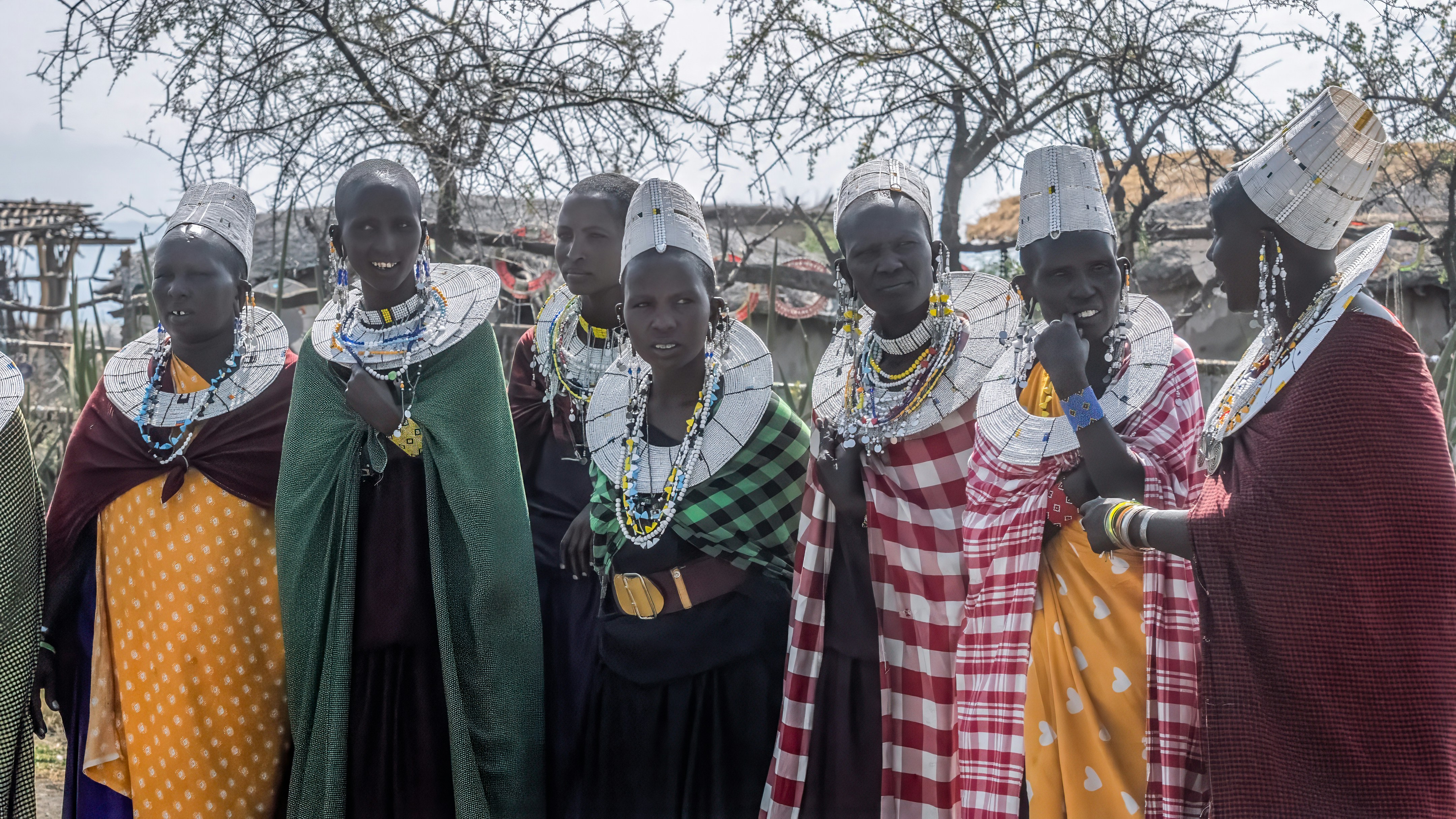 Adornment in the Village: A Row of Maasai-inspired Attire and Beaded Necklaces