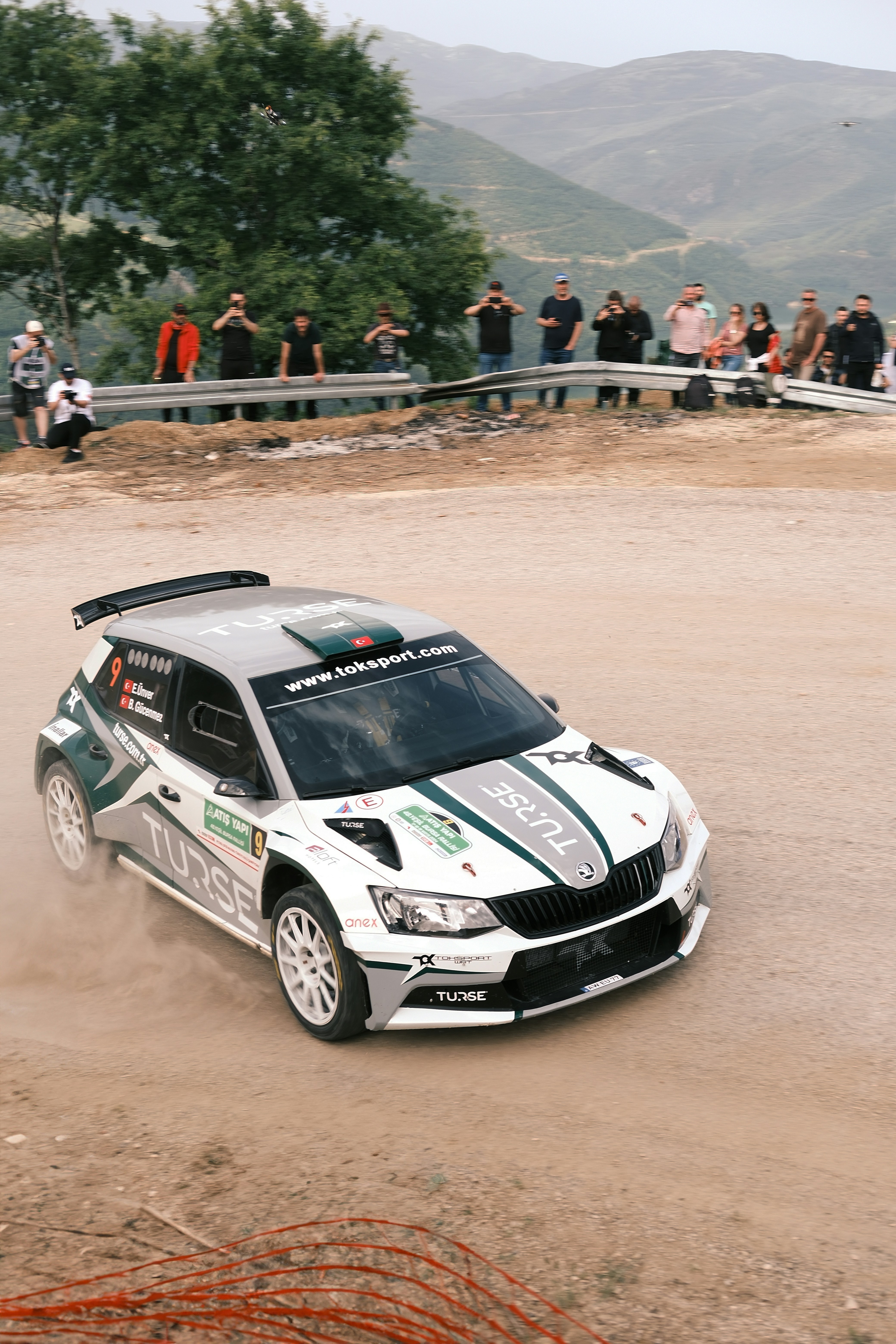 A rally car making a turn on a dirt track photo – Free Bursa Image on ...