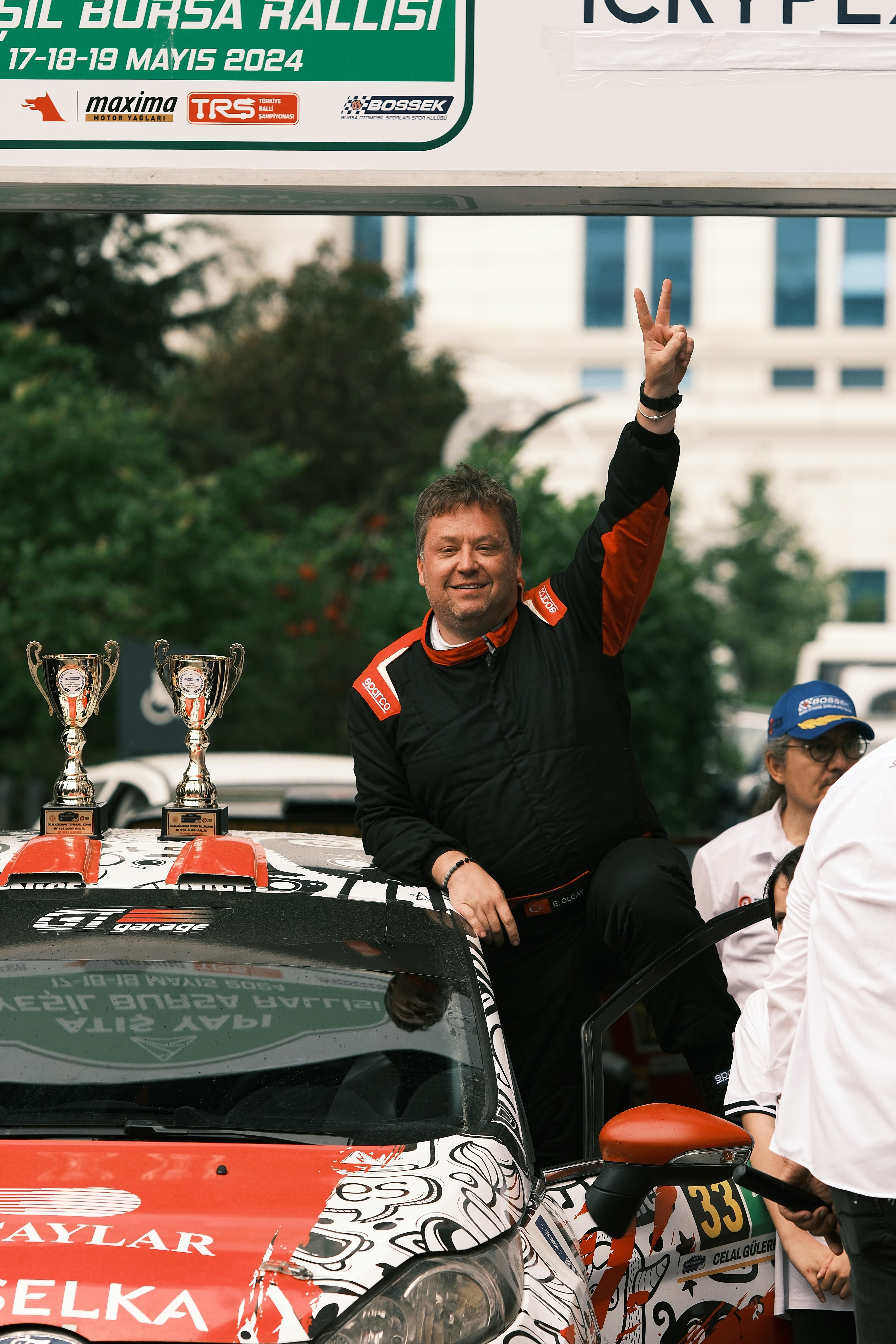 Peace Sign on the Podium Car: Turkish Rally Triumph