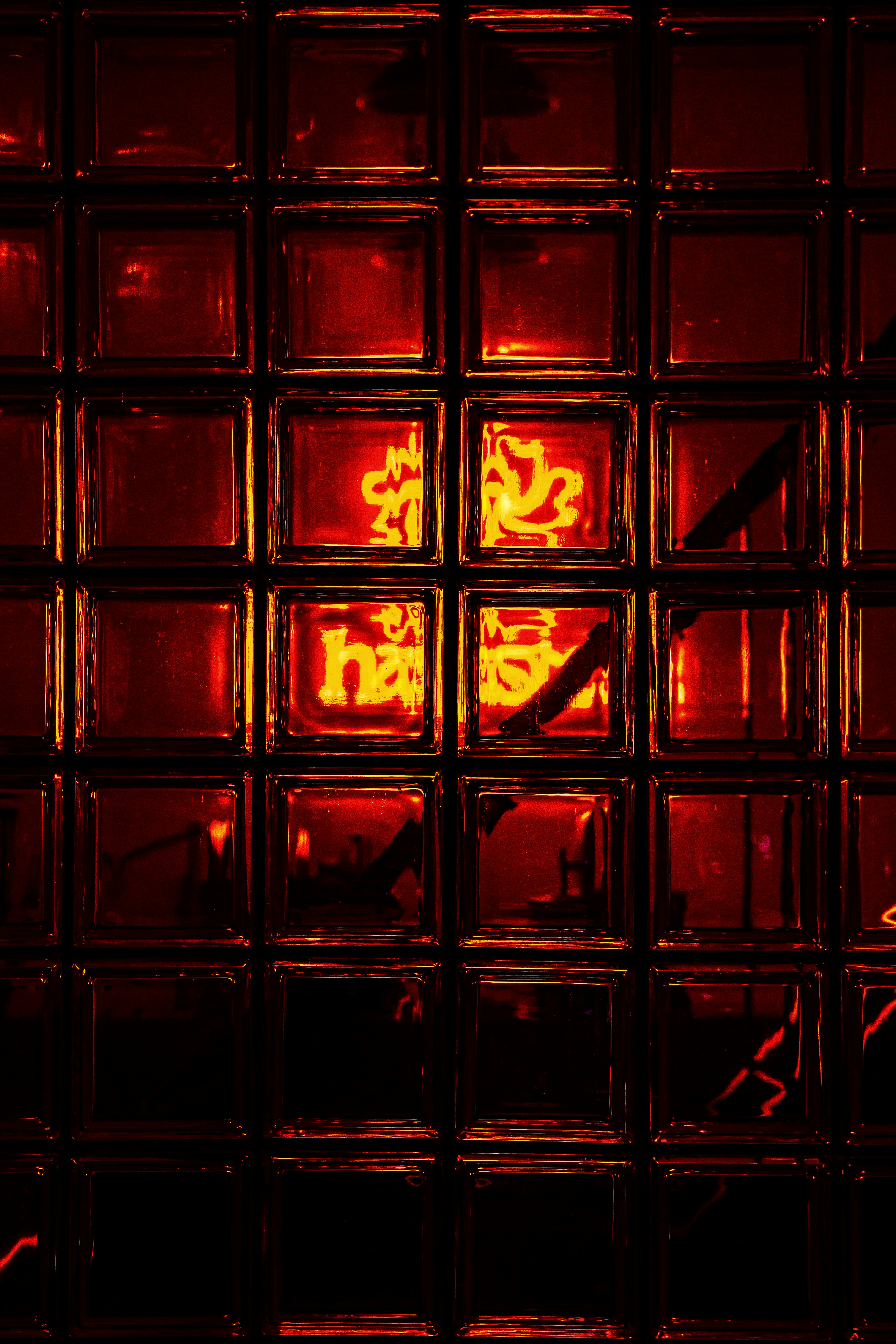 Crimson Grid Mosaic: Backlit Glass Tiles with Hidden Light Signatures