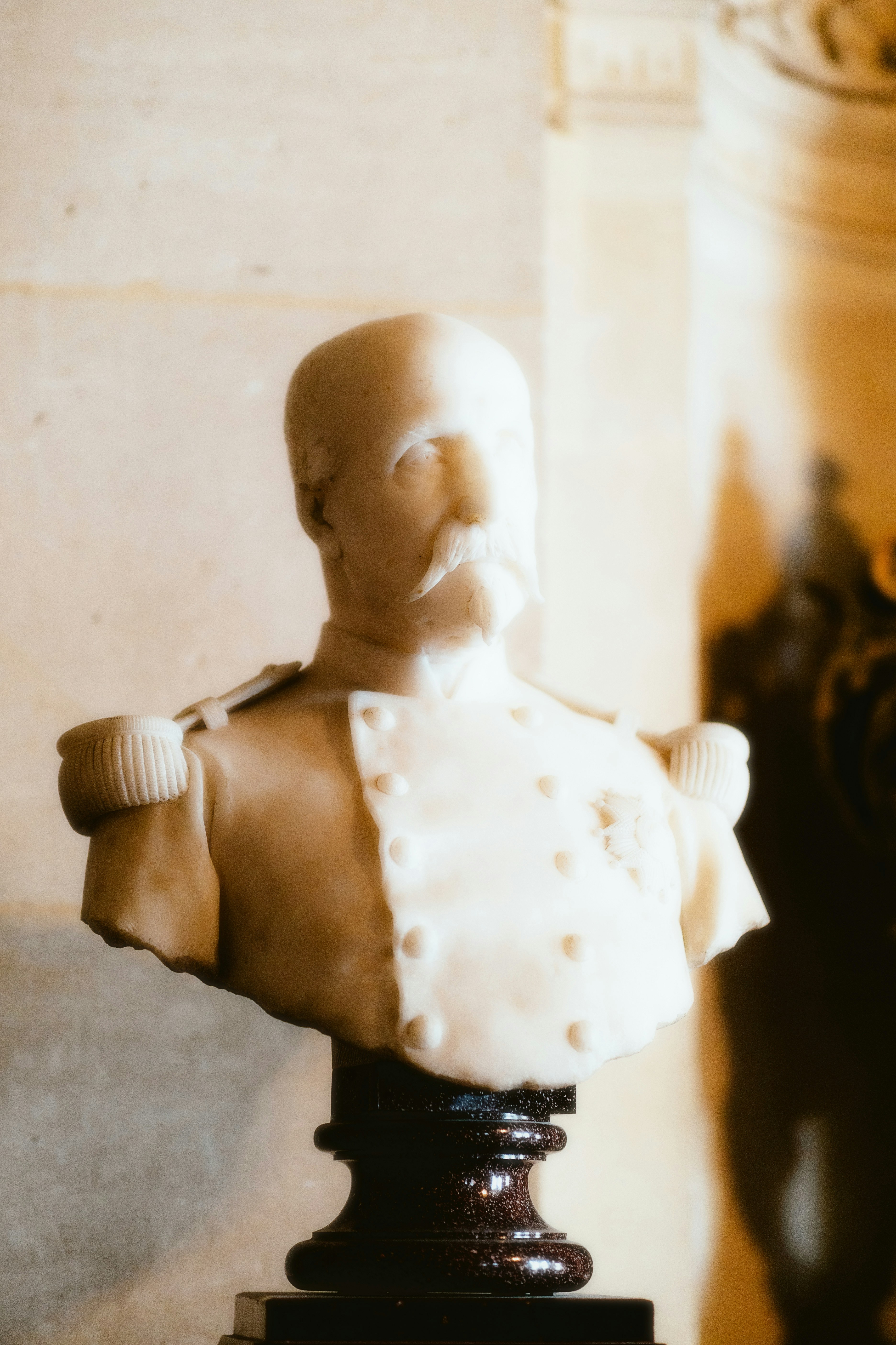 The Quiet Colonel: Marble Bust in Golden Gallery Light