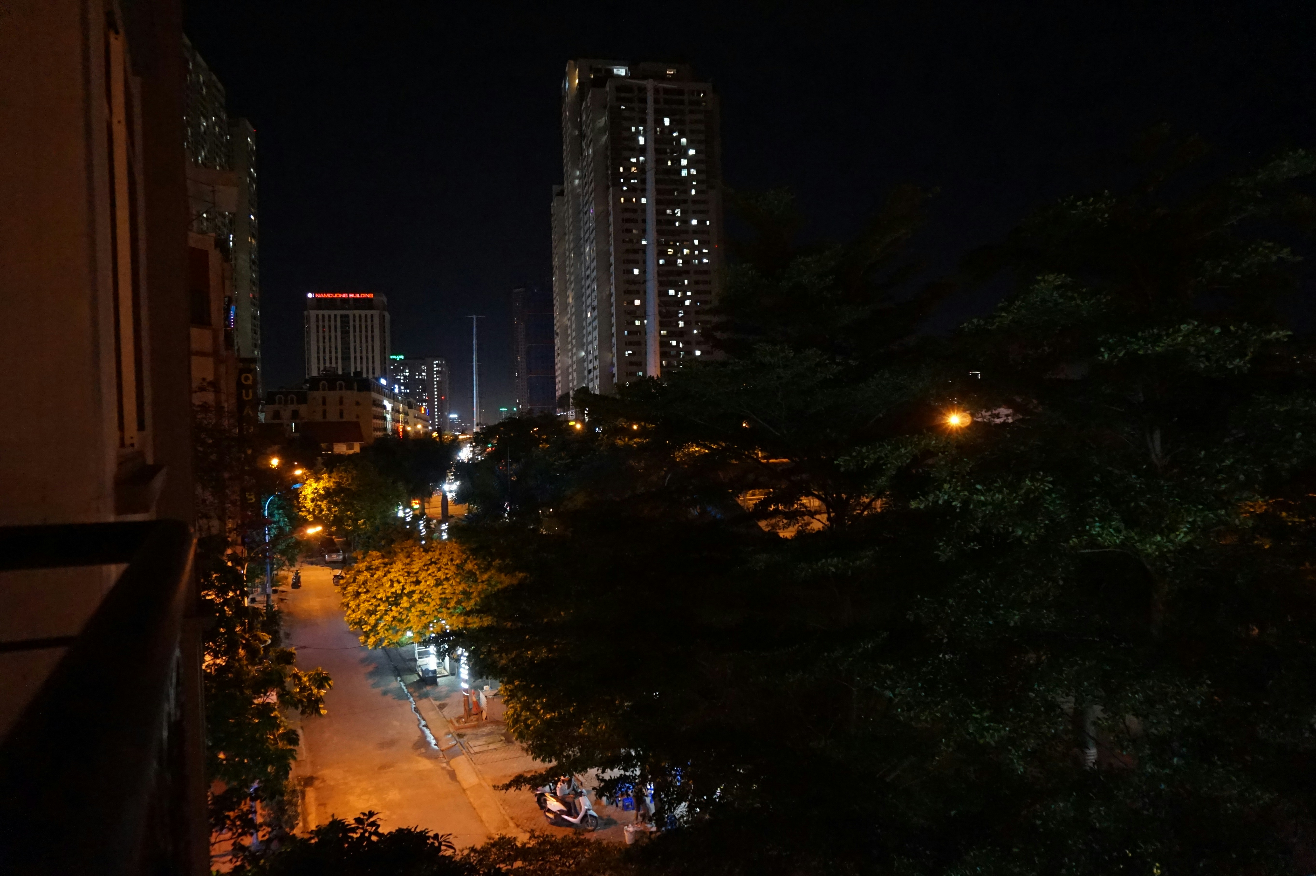 Neon Veil Over a Quiet City Street