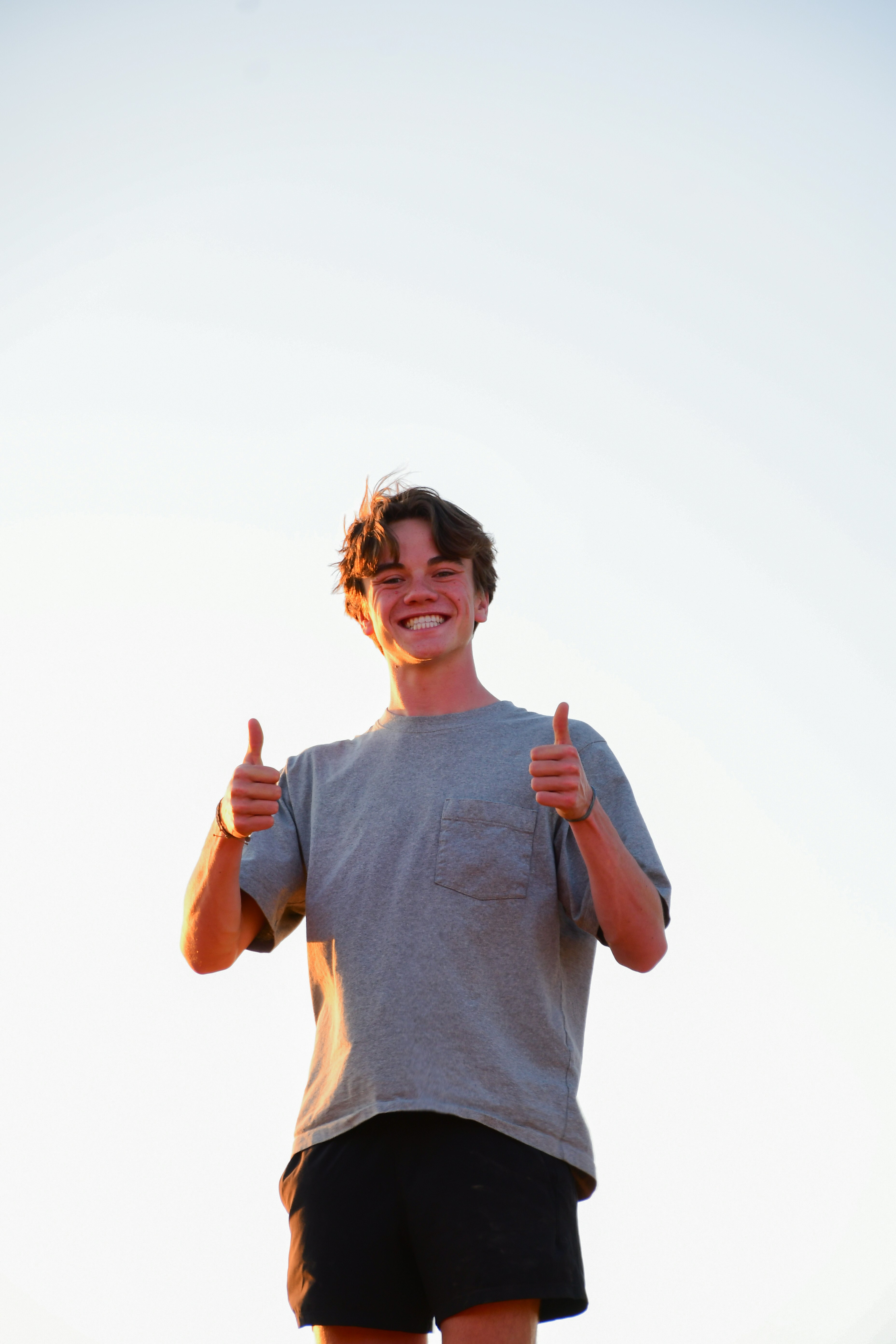 Thumbs Up Under an Open Sky