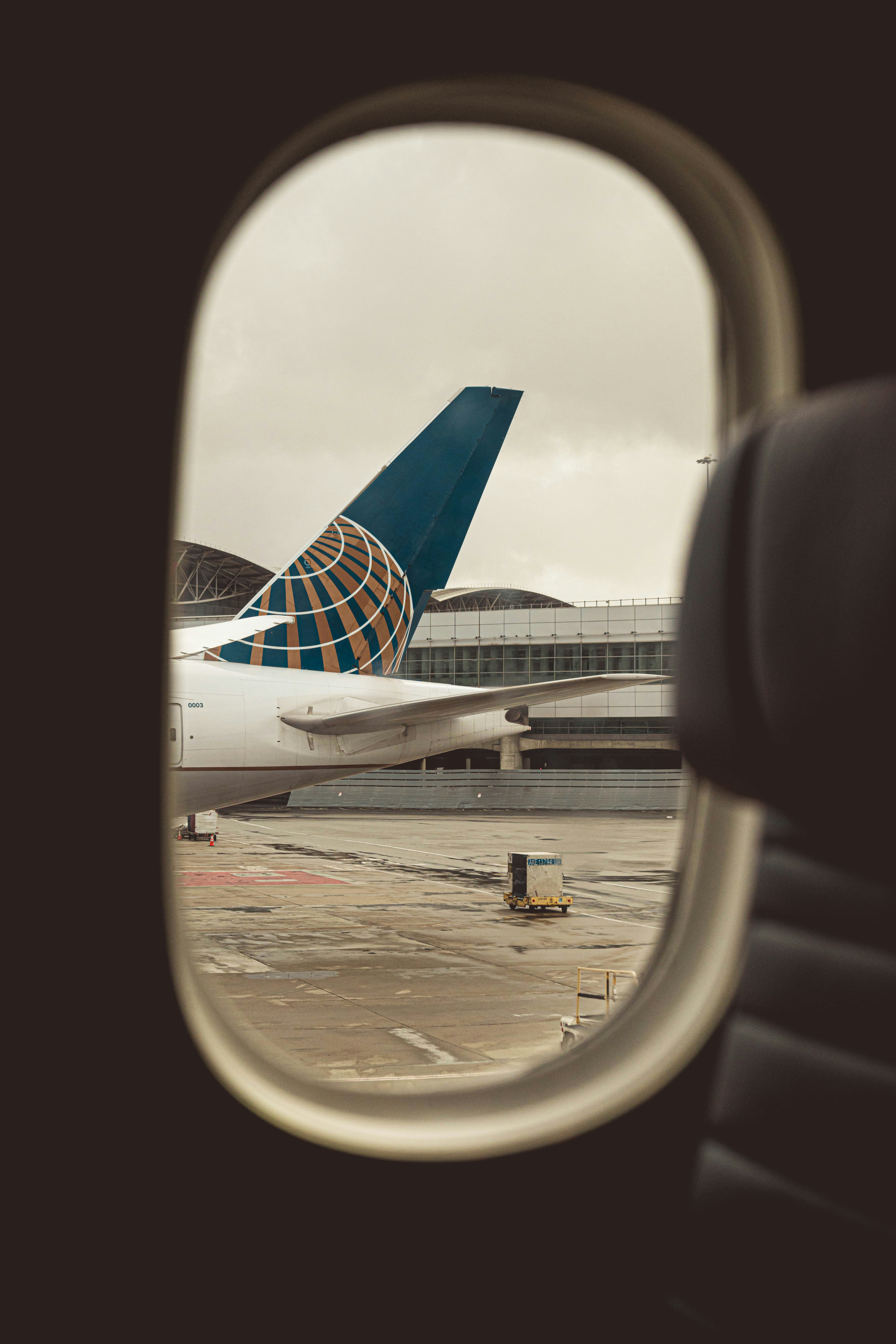 A view of an airplane through a window photo – Free San francisco Image ...