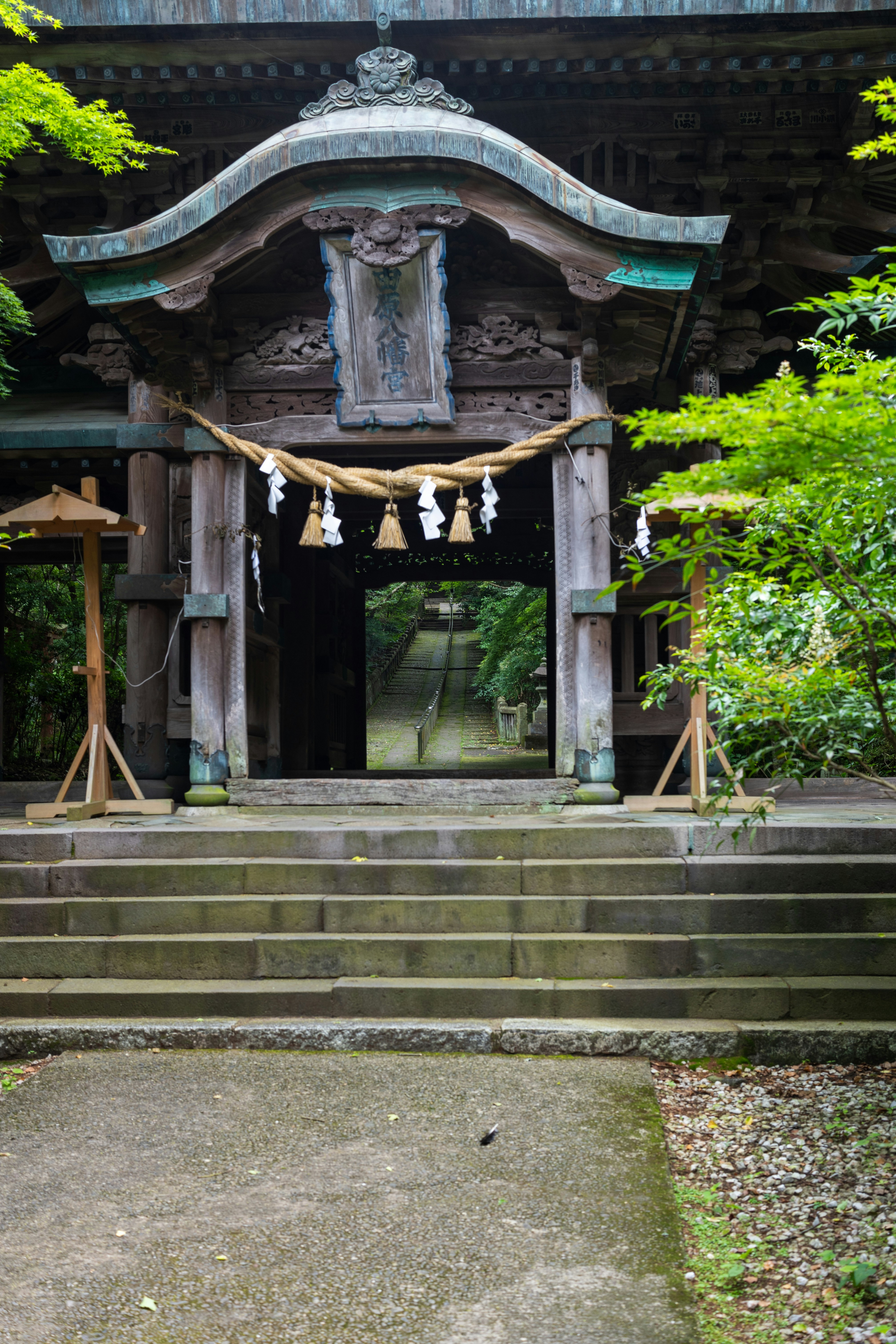 A wooden structure with bells hanging from it photo – Free Path Image ...