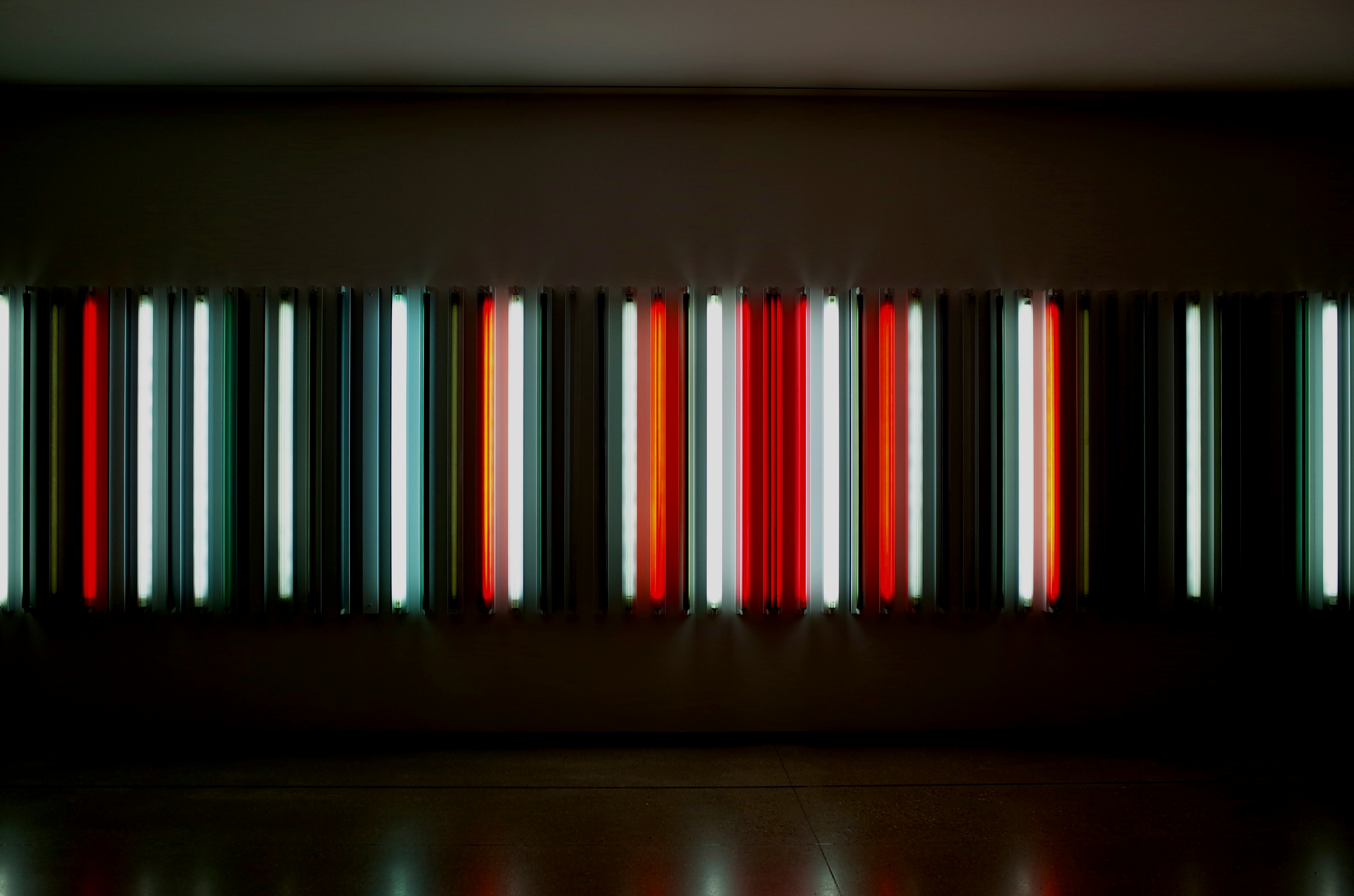 A wall with a lot of different colored bars on it photo – Free Lacma ...
