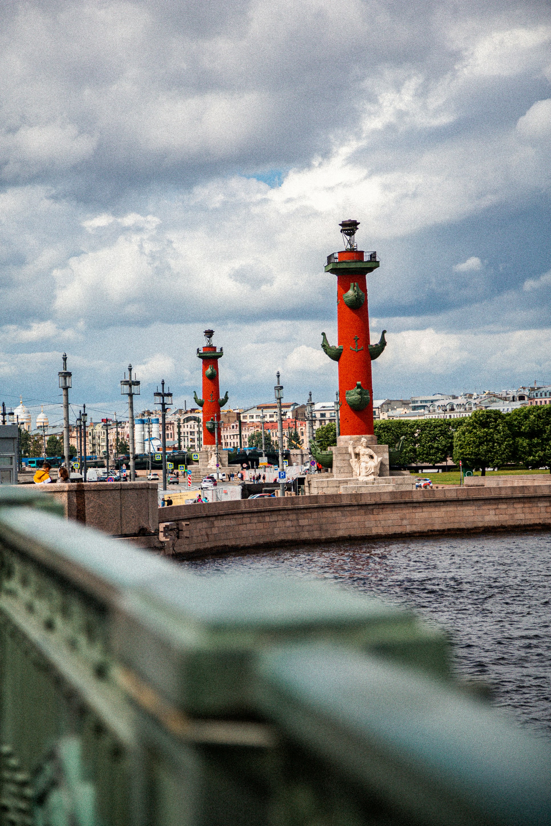 A bridge that has a red light tower in the background photo – Free ...