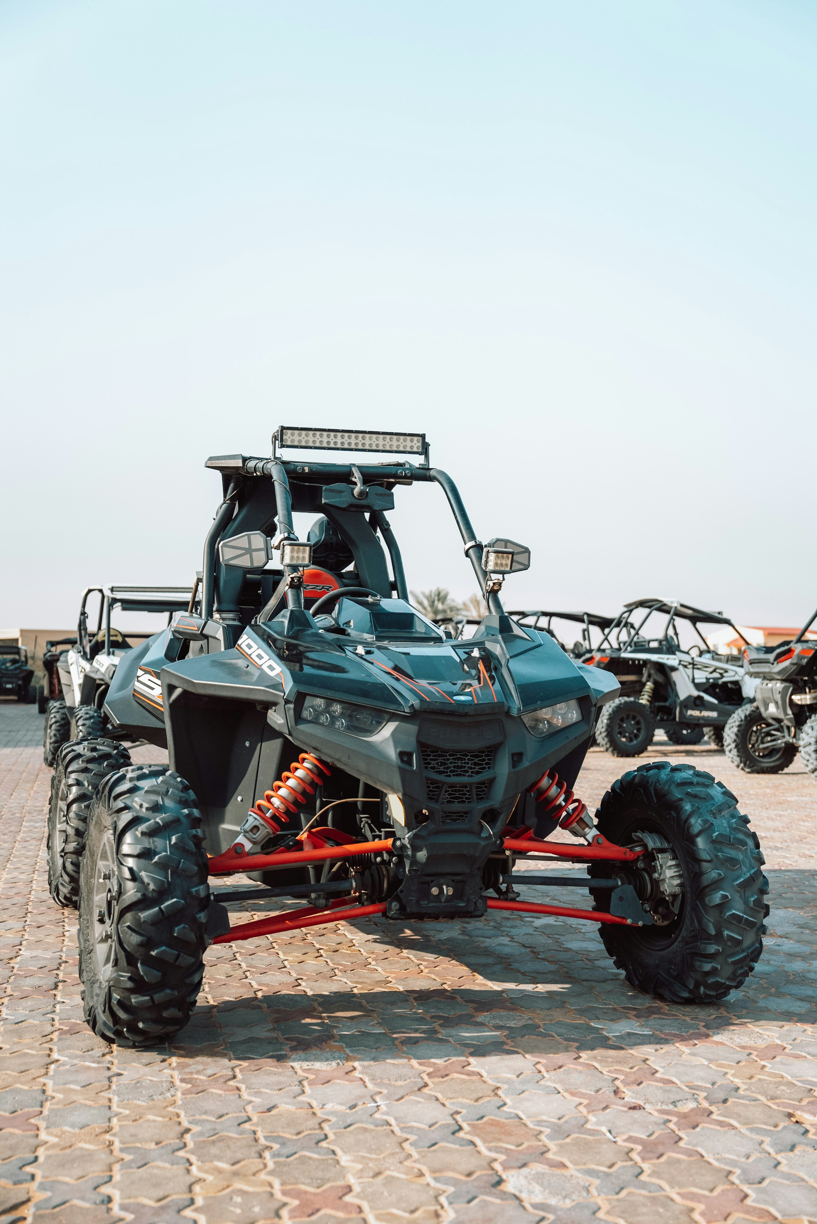 A four - wheeler is parked in a parking lot photo – Free Dubai - united ...