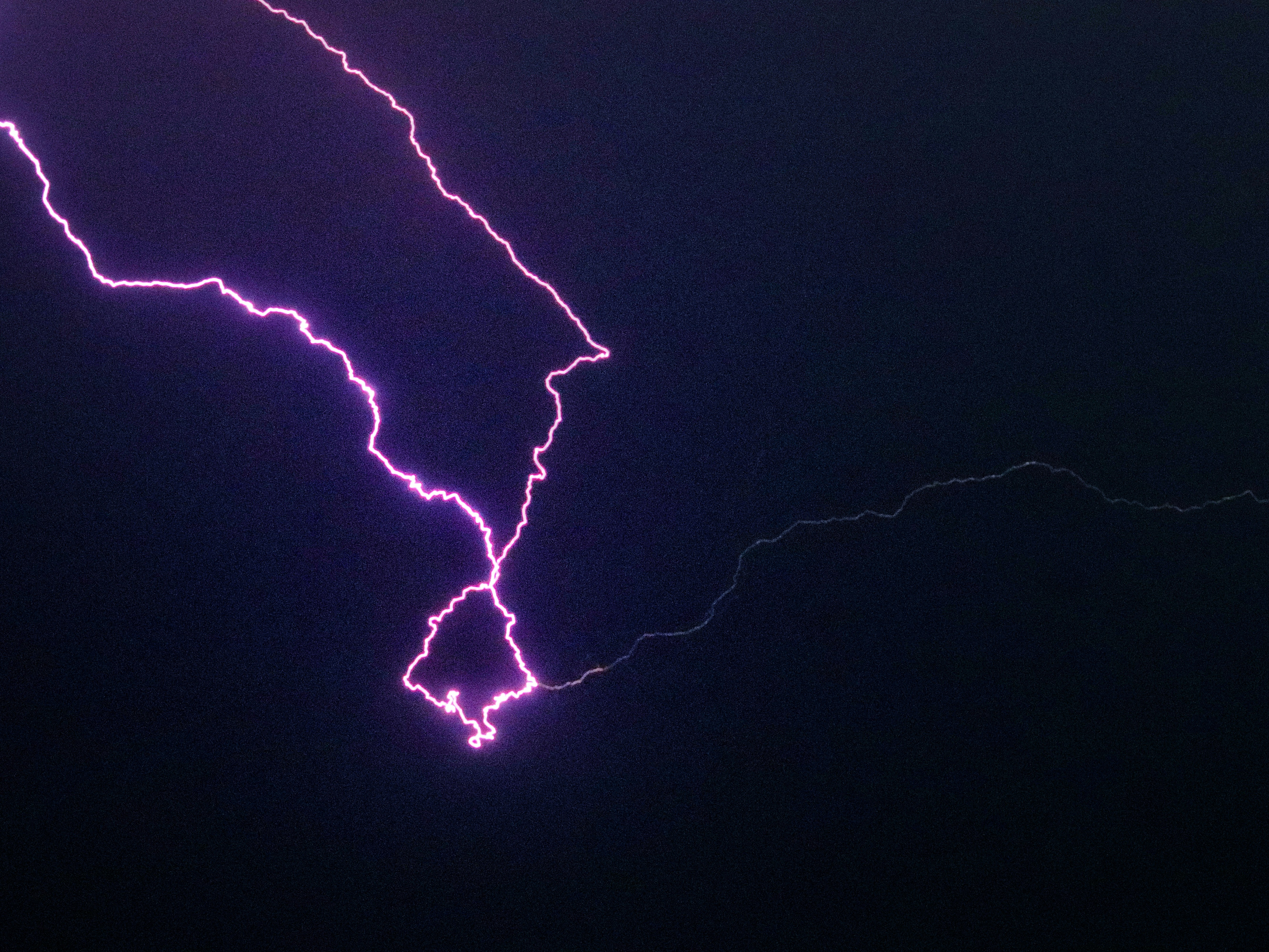 Thunderstruck Lightning | A lightning bolt is seen in the dark sky