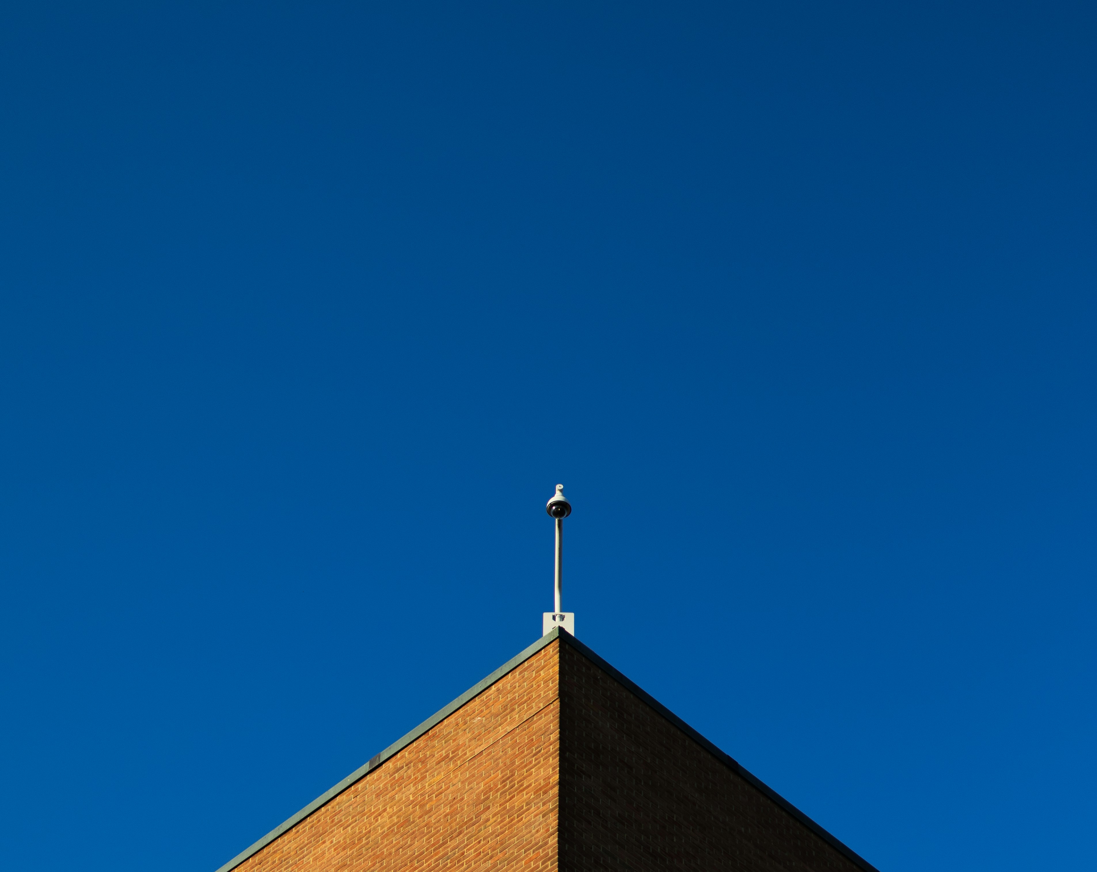 Azure Crest: A Brick Peak Reaching Toward the Sky