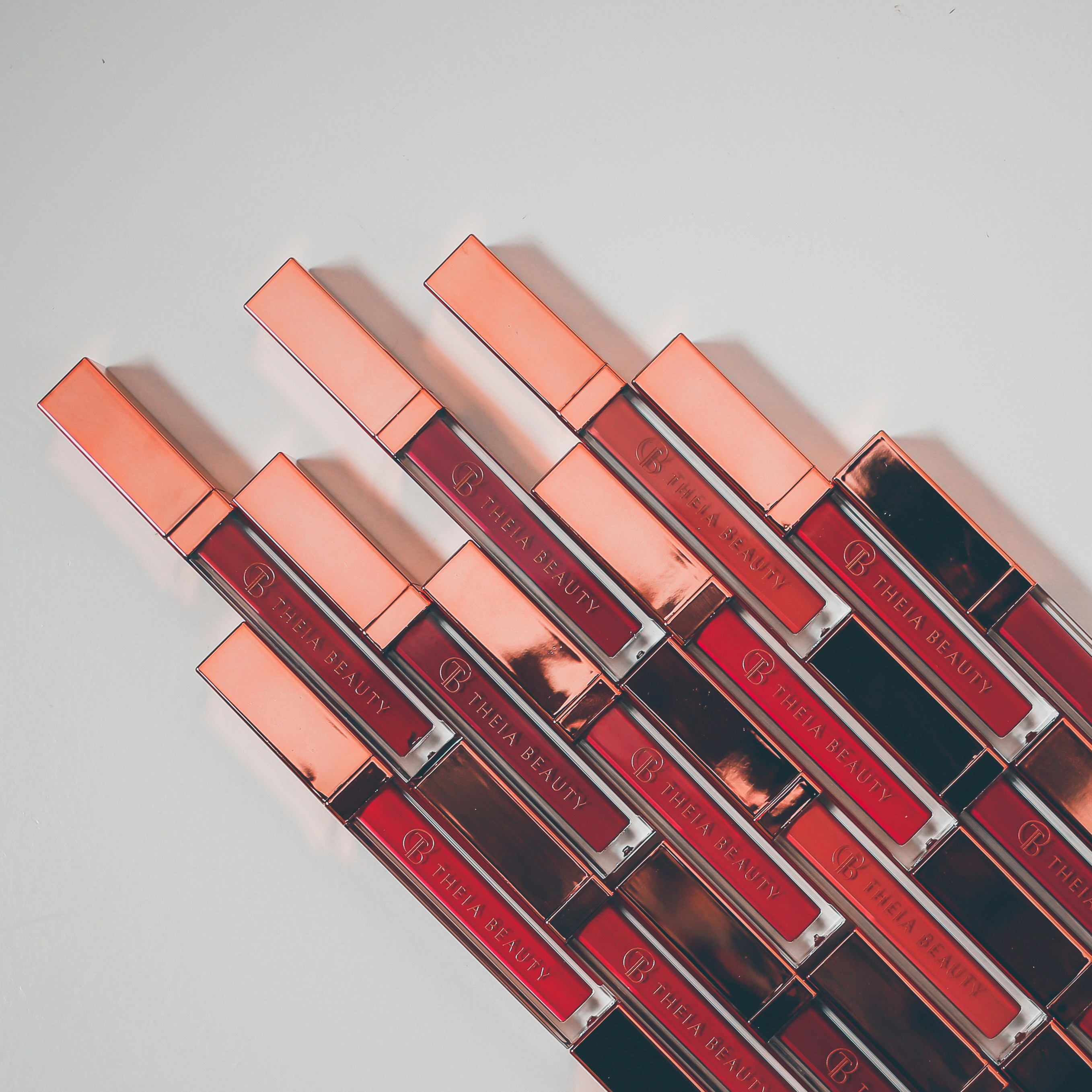 A group of lipsticks stacked on top of each other photo – Free Lipstick ...