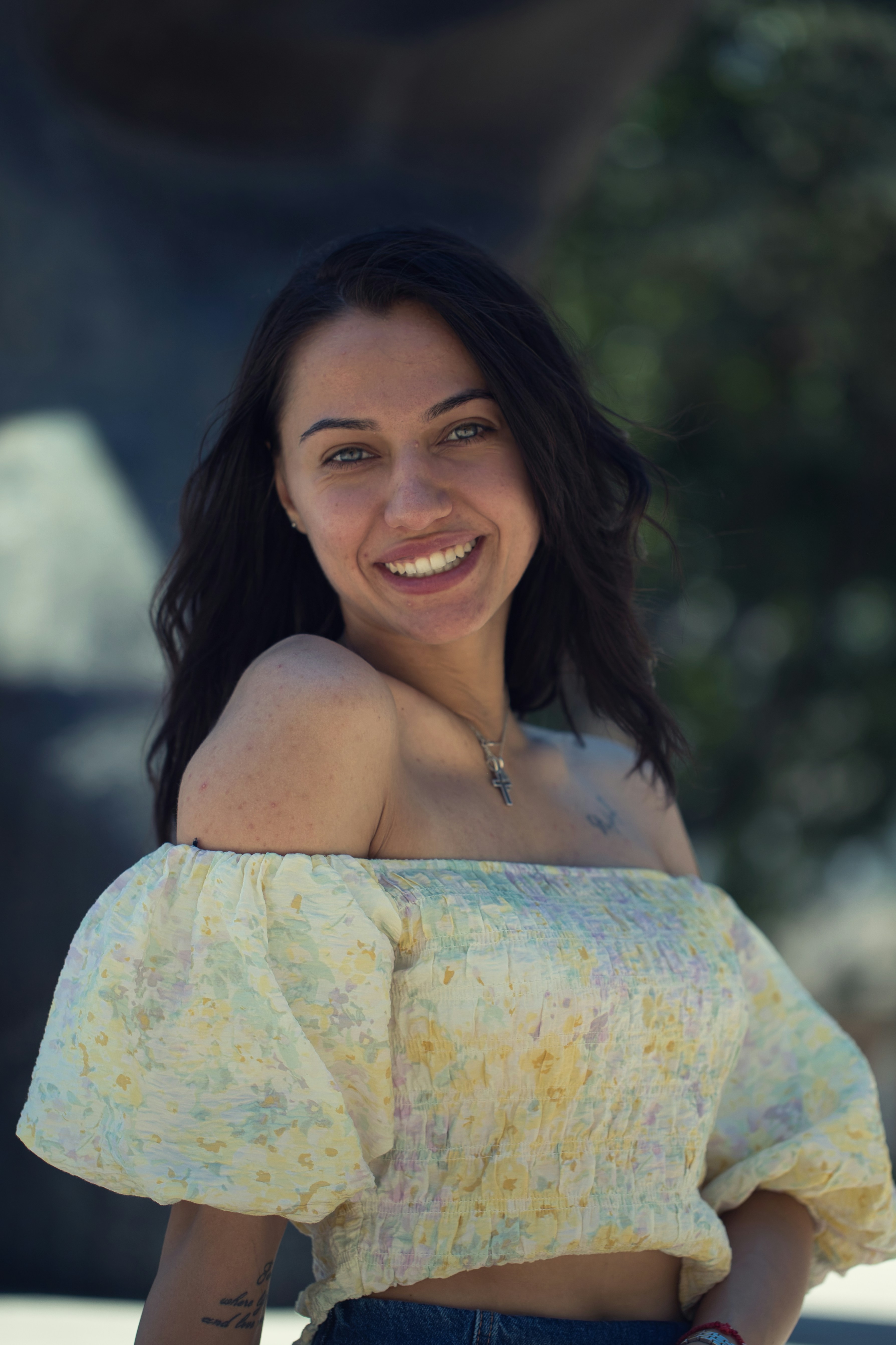 Sunlit Smile in Soft Pastels: A Warm Outdoor Portrait