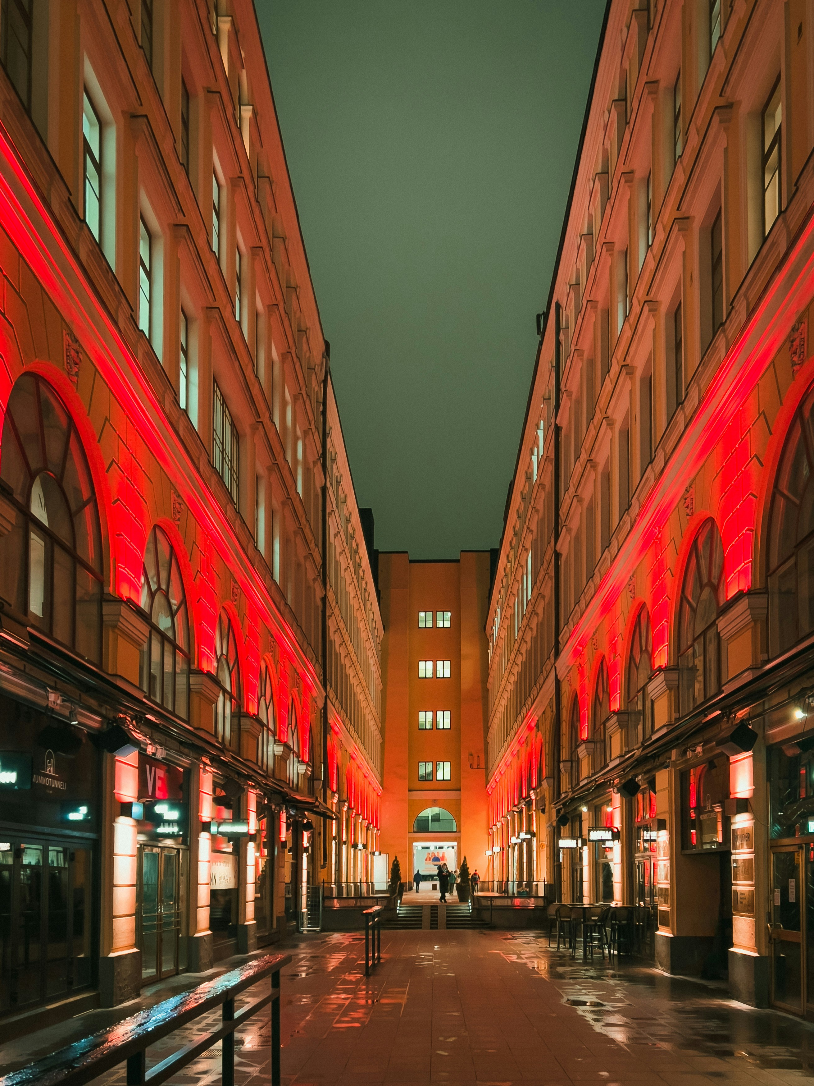 Red Neon Alleyway: Nighttime Center of Urban Glow
