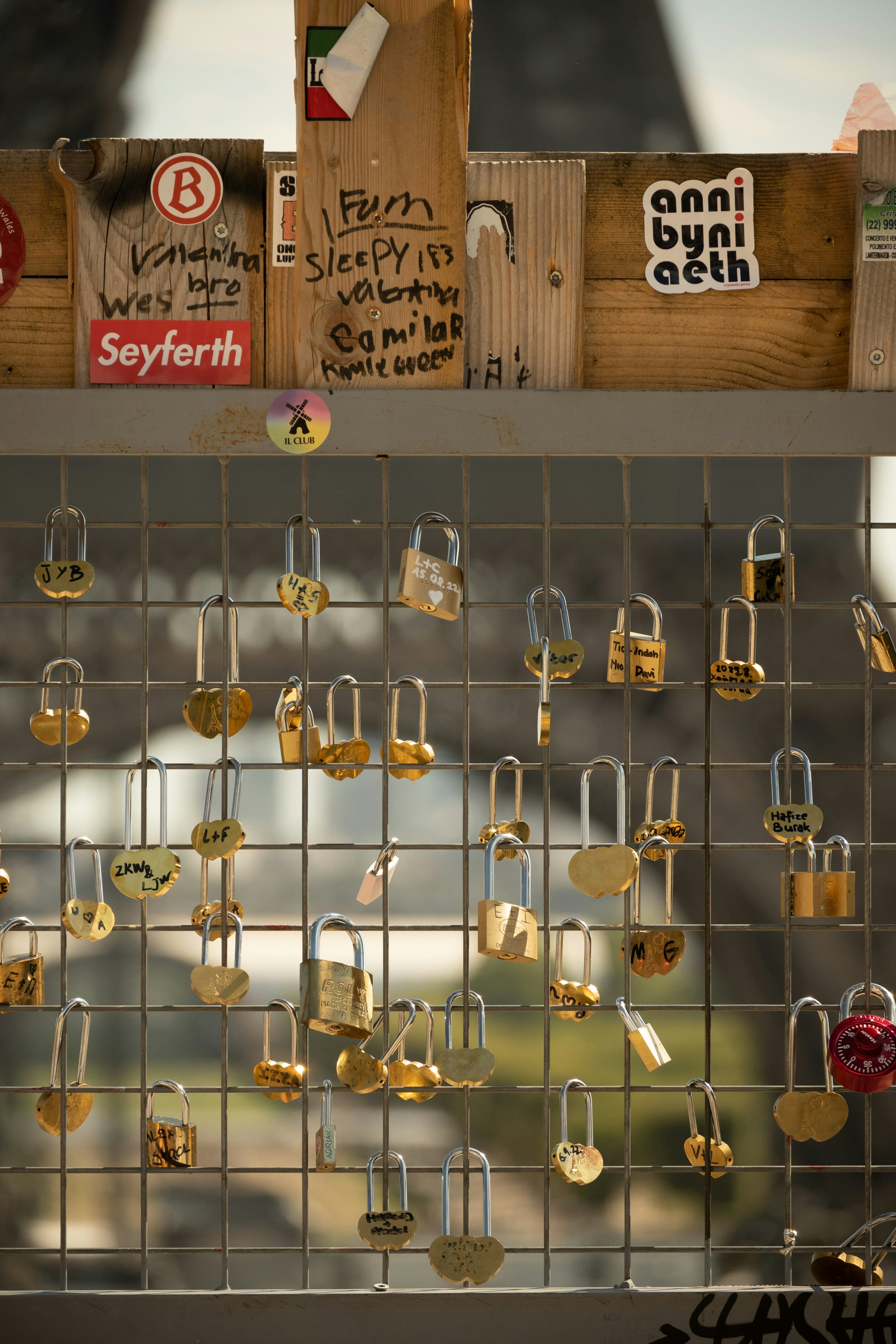 A bunch of locks are attached to a fence photo – Free Paris Image on ...