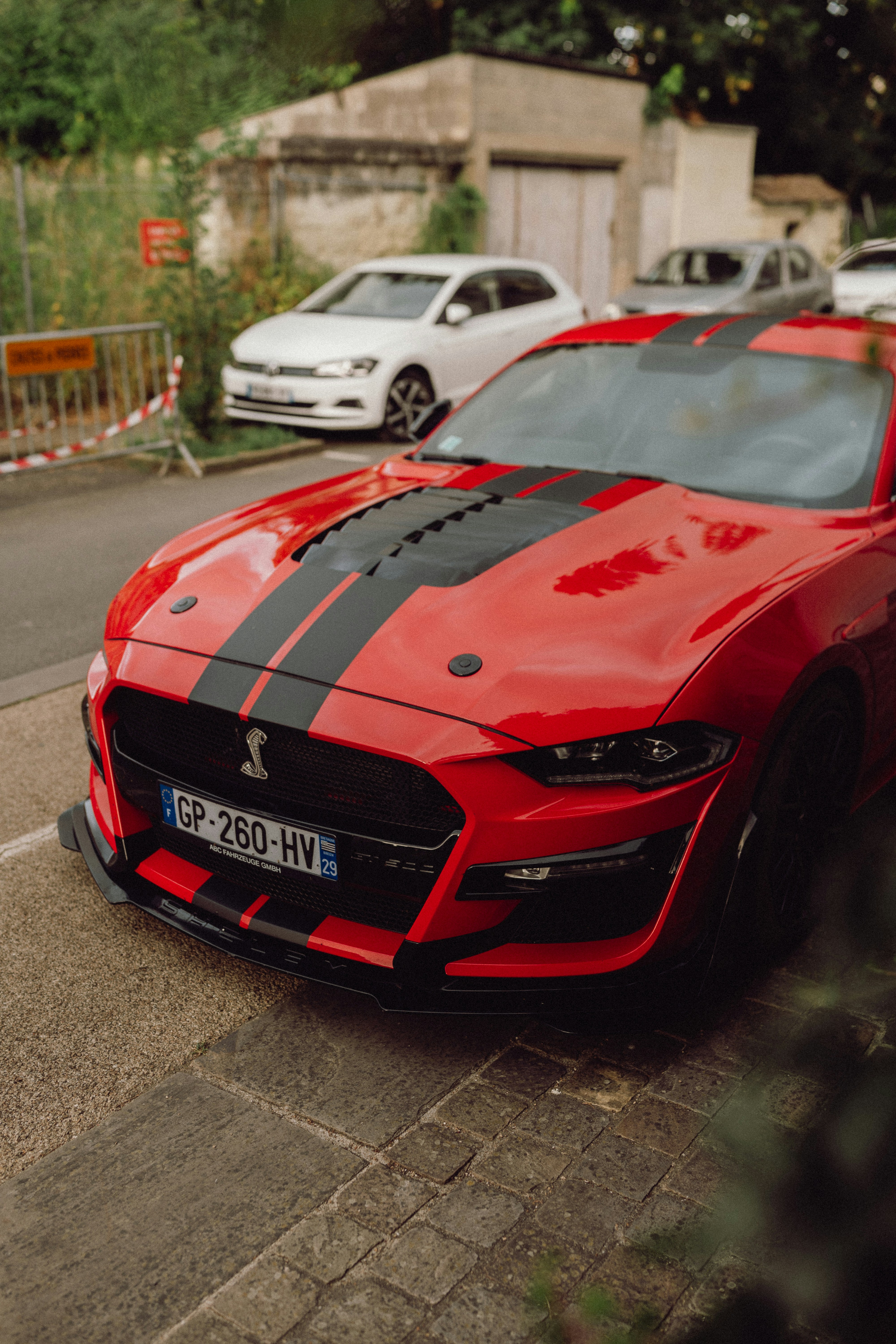 Red Fury: The Shelby Mustang in Urban Setting