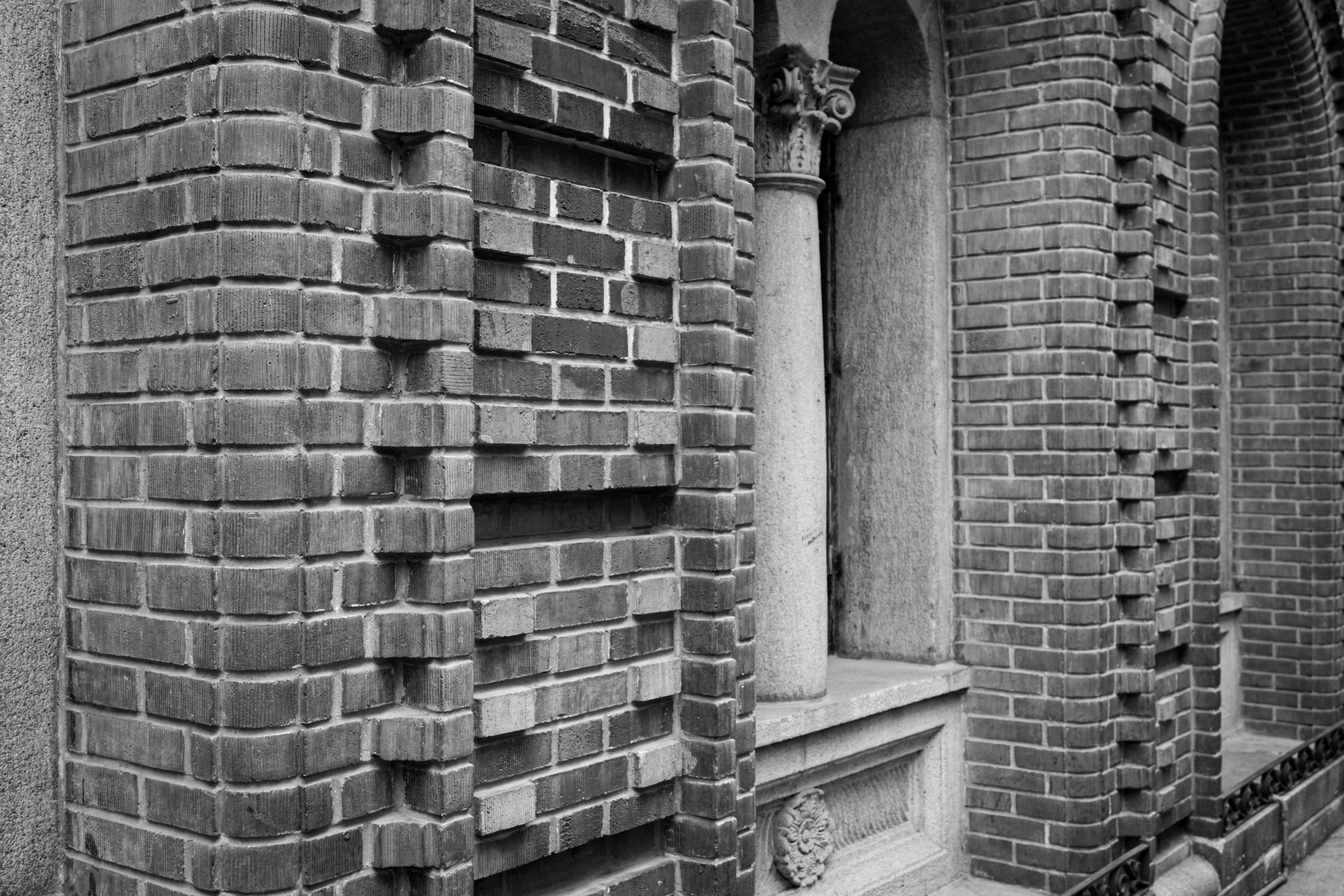 A black and white photo of a brick building photo – Free Huangpu Image ...