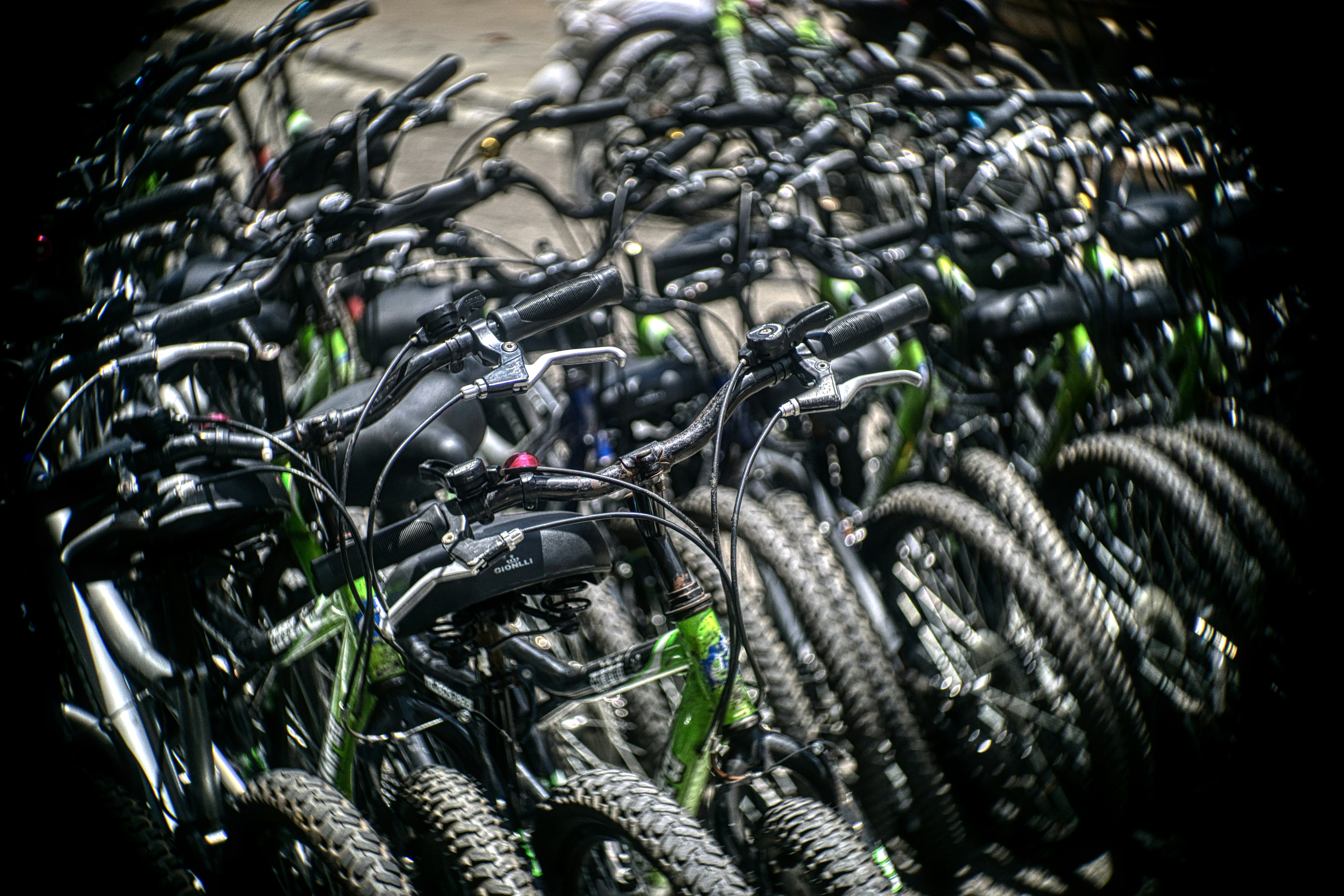 A bunch of bikes that are parked together photo – Free Grey Image on ...