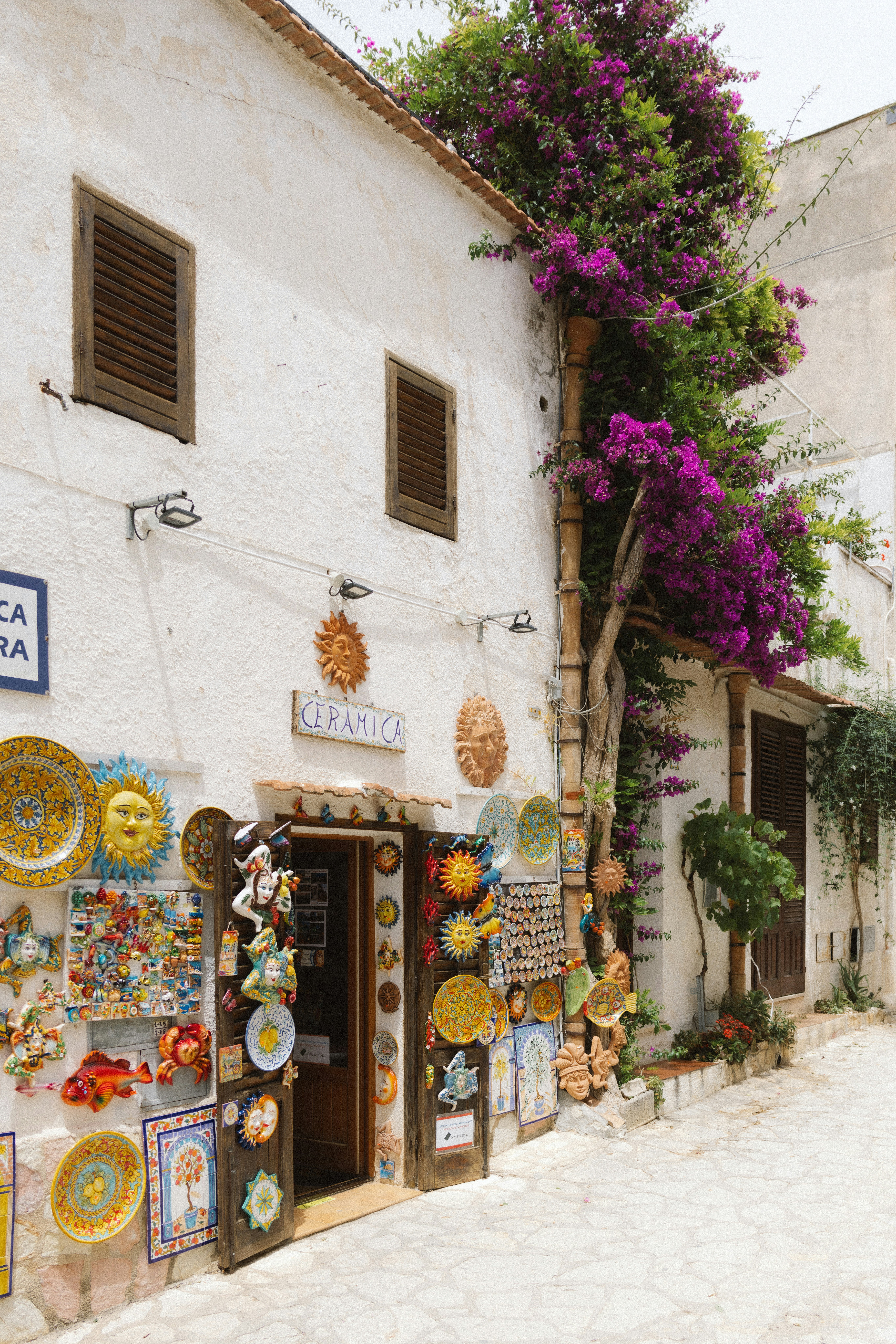 Colorful Ceramic doorway under blooming bougainvillea
