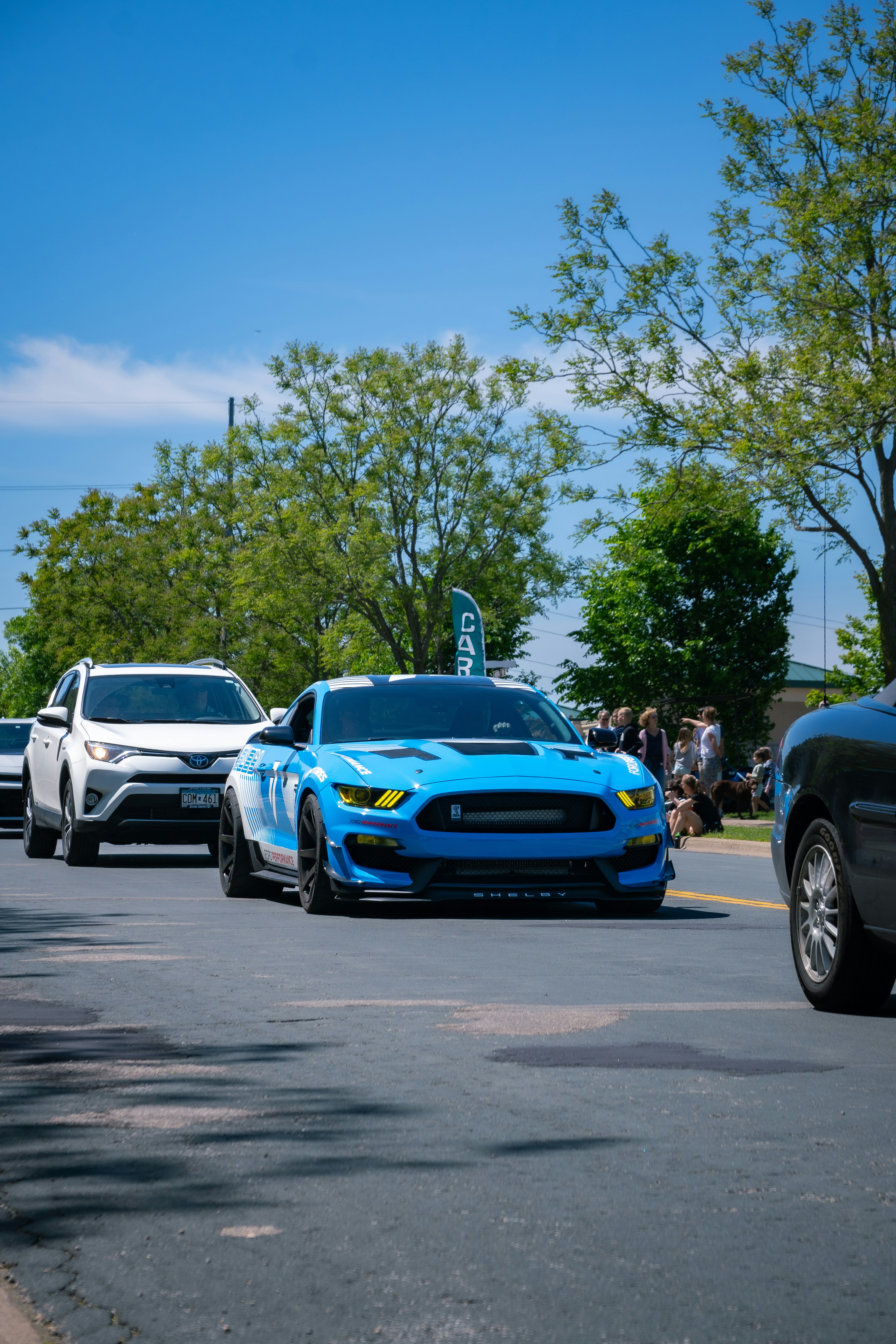 A line of cars parked on the side of a road photo – Free Chanhassen ...
