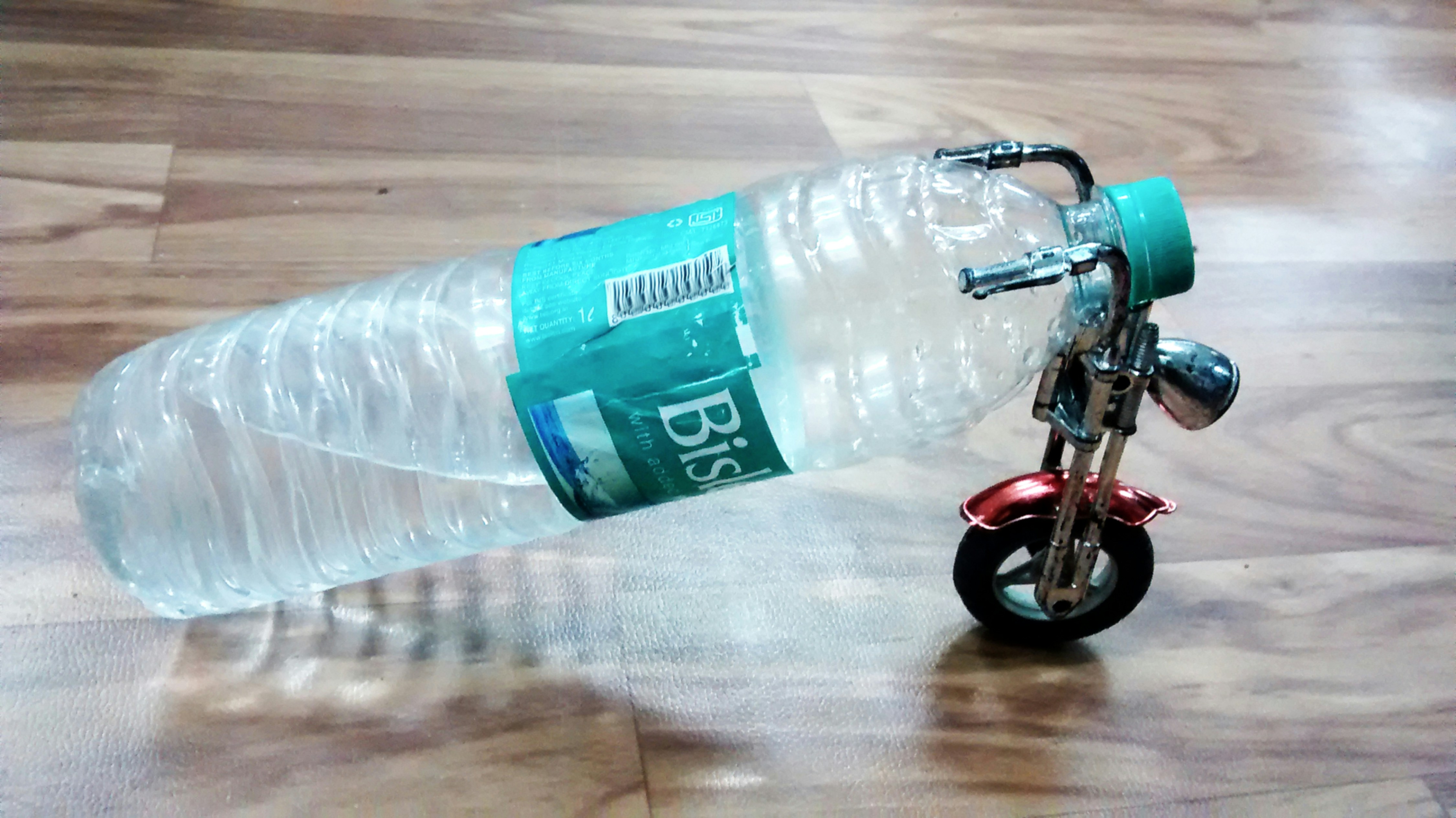 Bottle Rocket: A Water Bottle Reimagined as a Tiny Tricycle