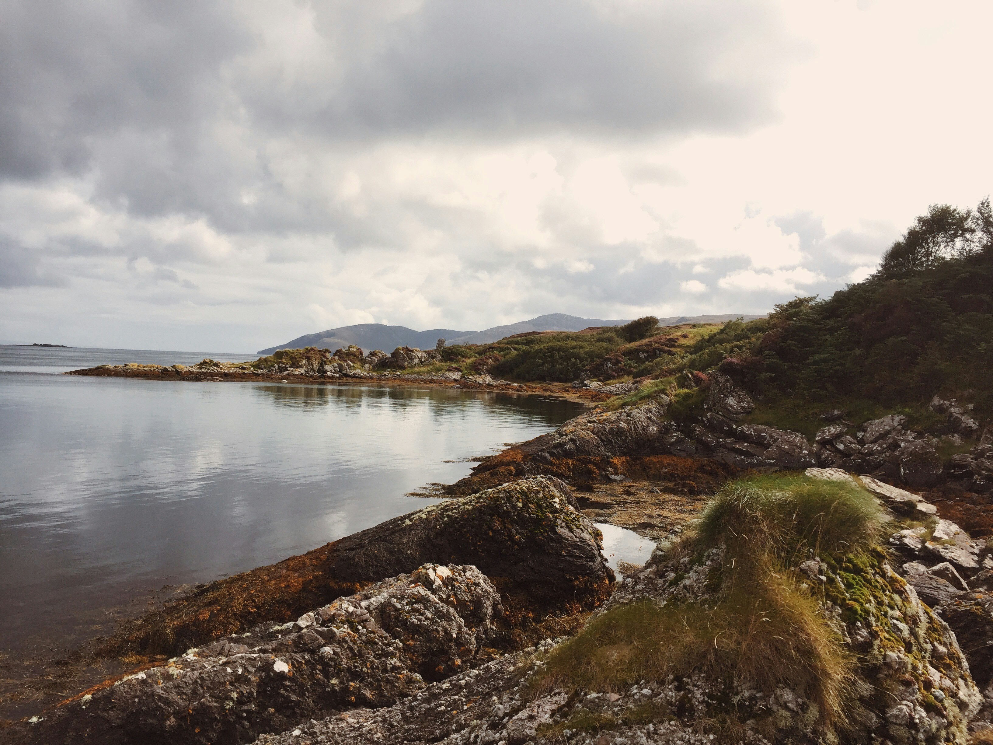 Scotland's beauty never stops you wondering | A large body of water surrounded by rocks