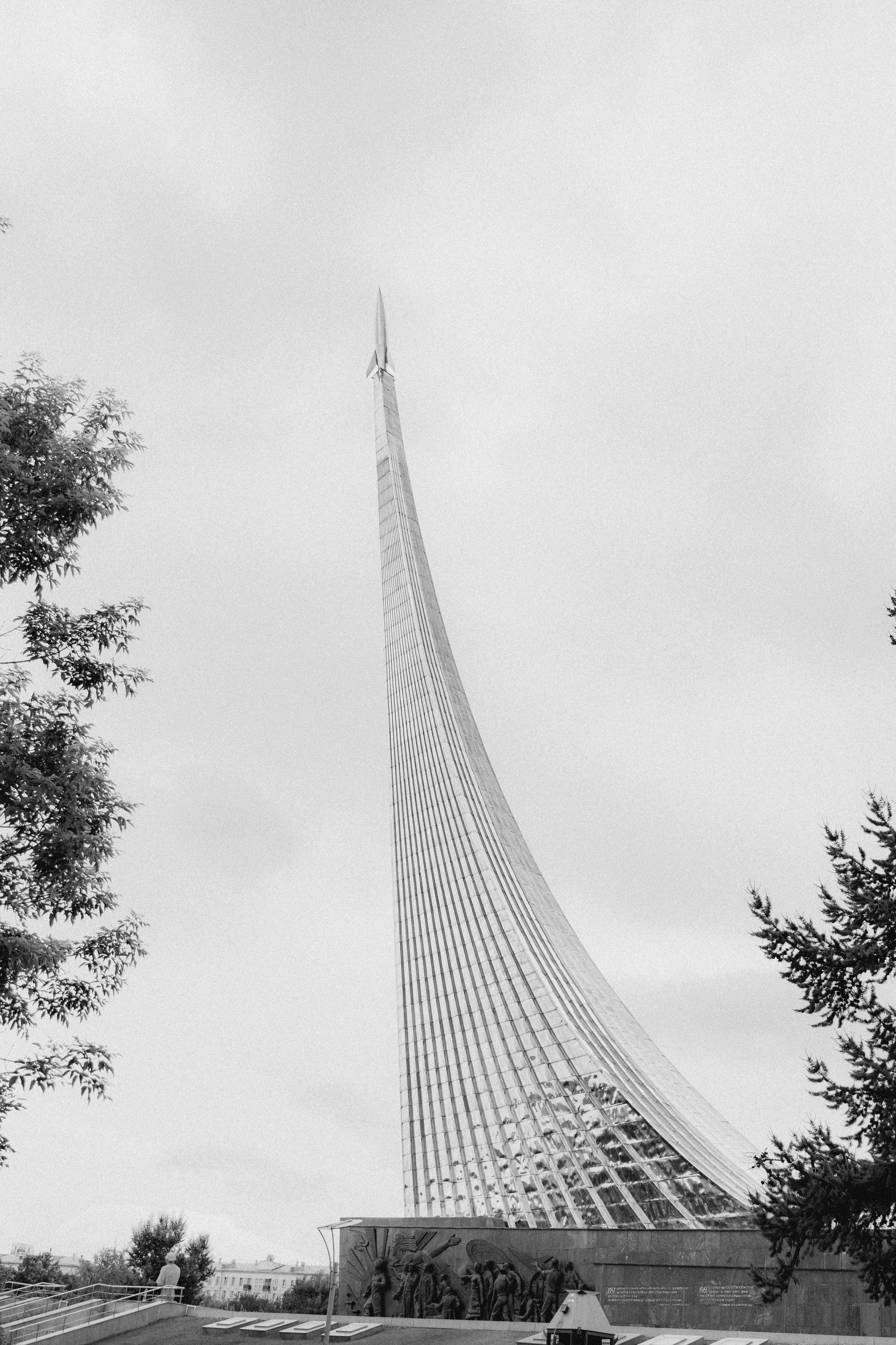Curved Spire in Mono: A Ribbonlike Monument Piercing the Overcast