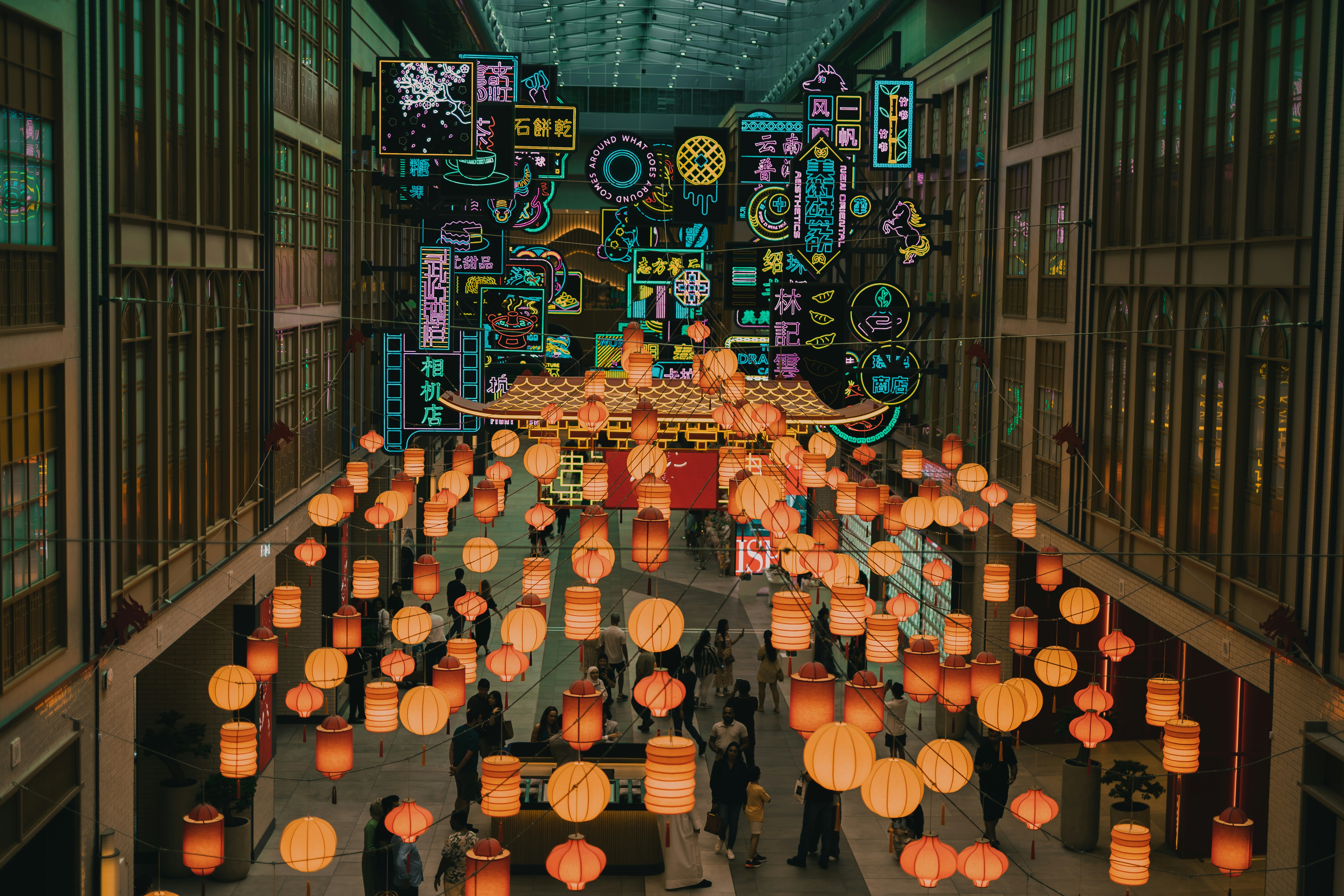 Lantern River under Neon Skies in a City Atrium